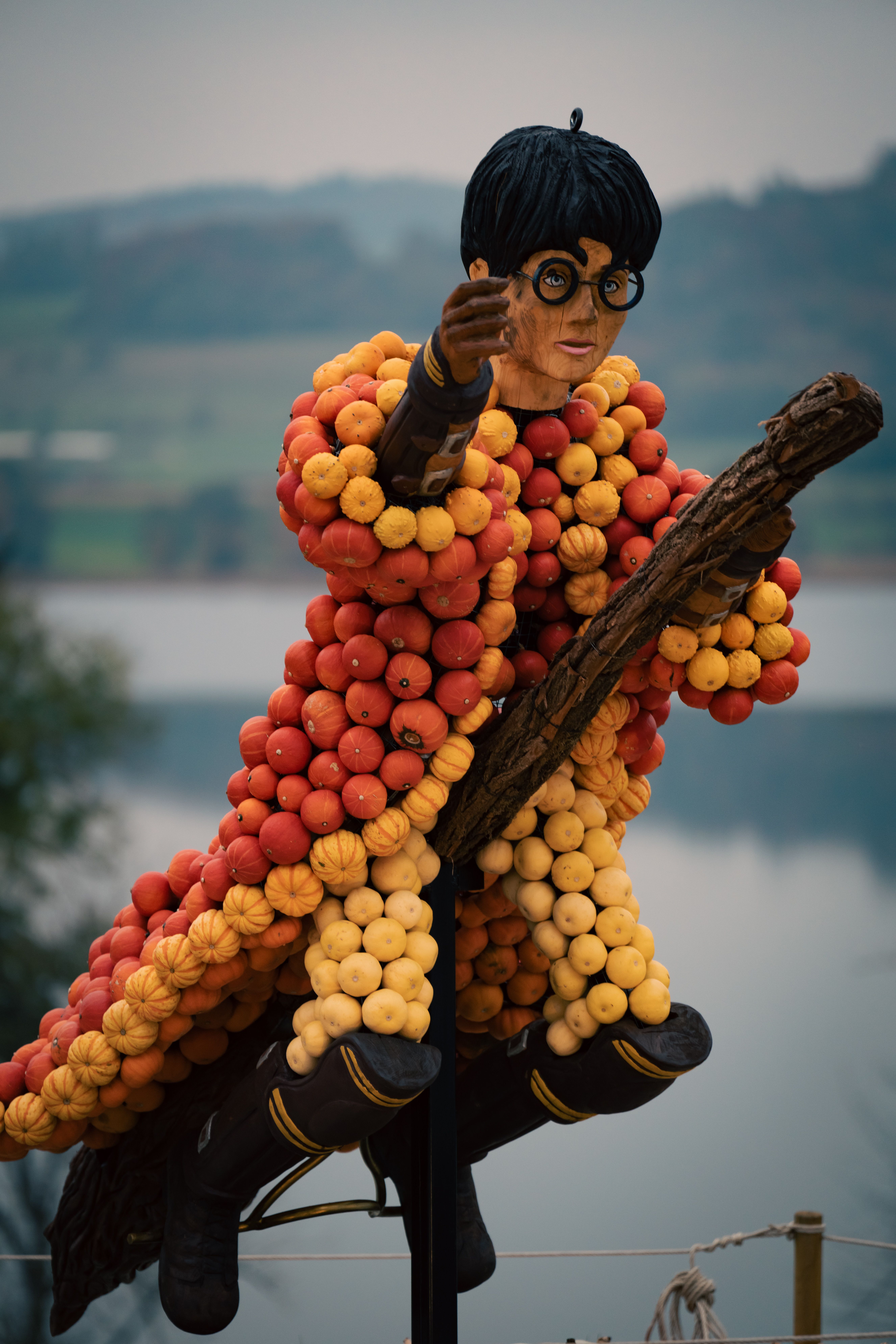 Creative Sculpture of Wizard Character in Fruit Costume · Free Stock Photo