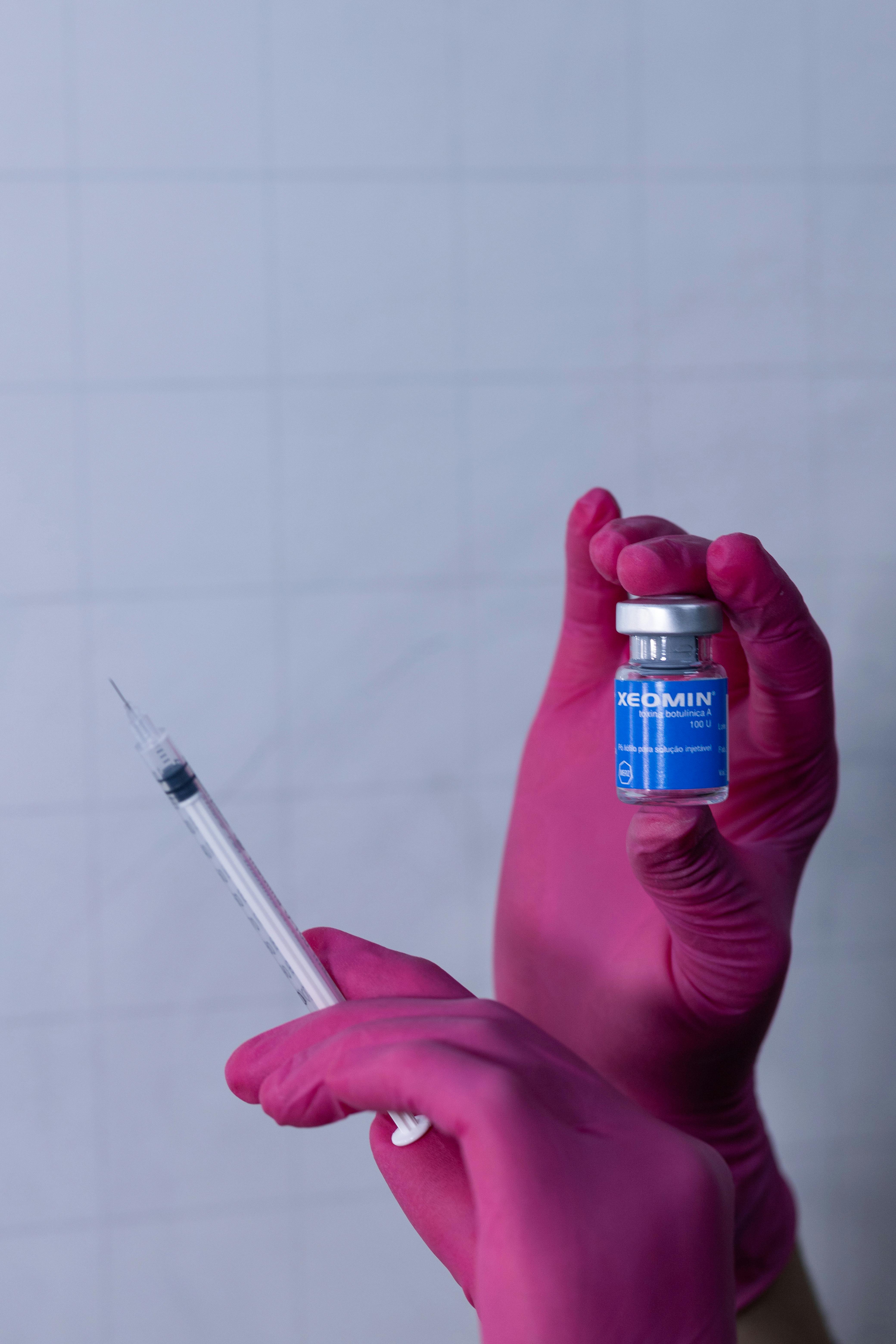 Photo Of Person Holding Syringe · Free Stock Photo