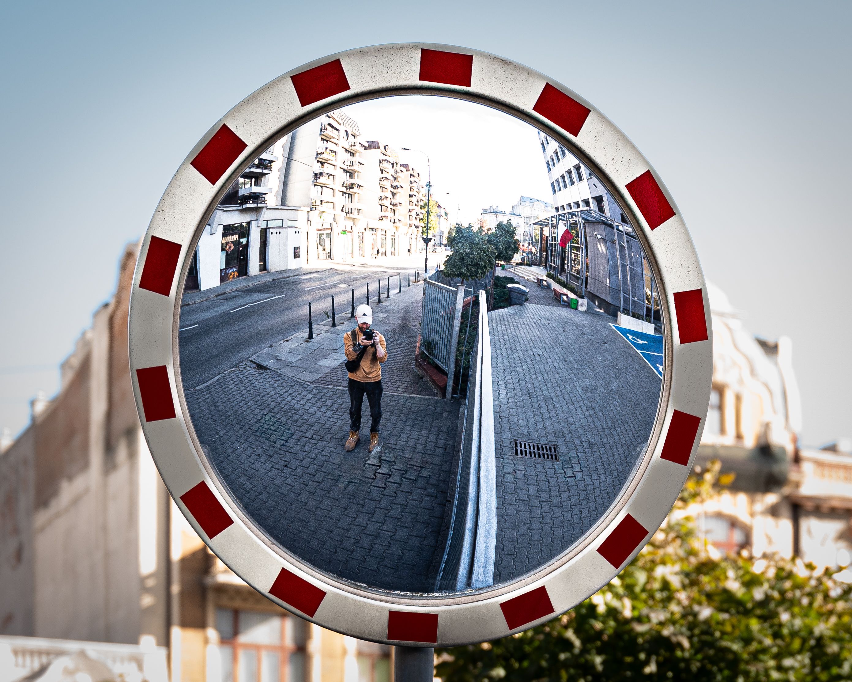 Urban Reflection in Traffic Mirror at Łódź · Free Stock Photo