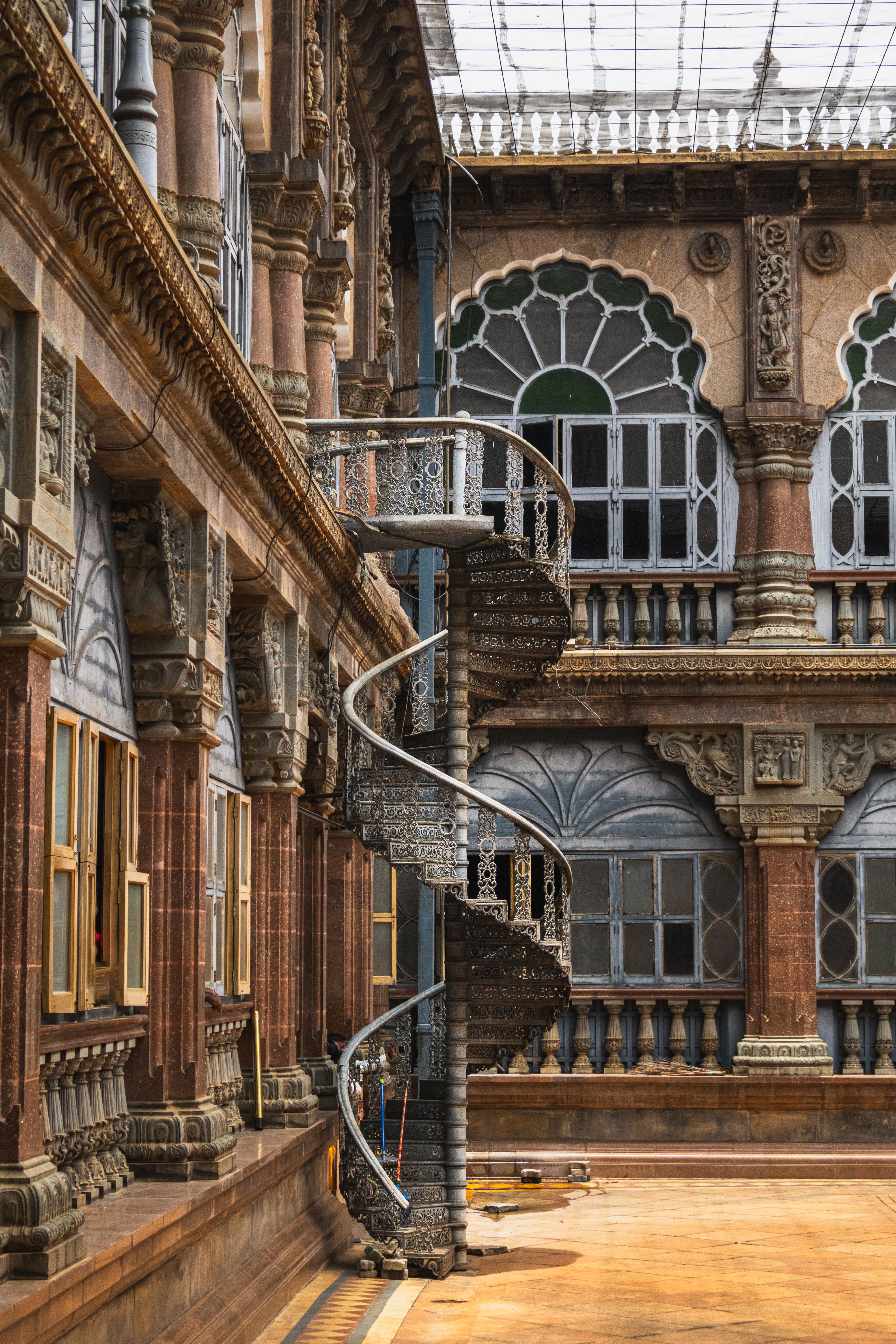 Historic Spiral Staircase in Ornate Courtyard · Free Stock Photo