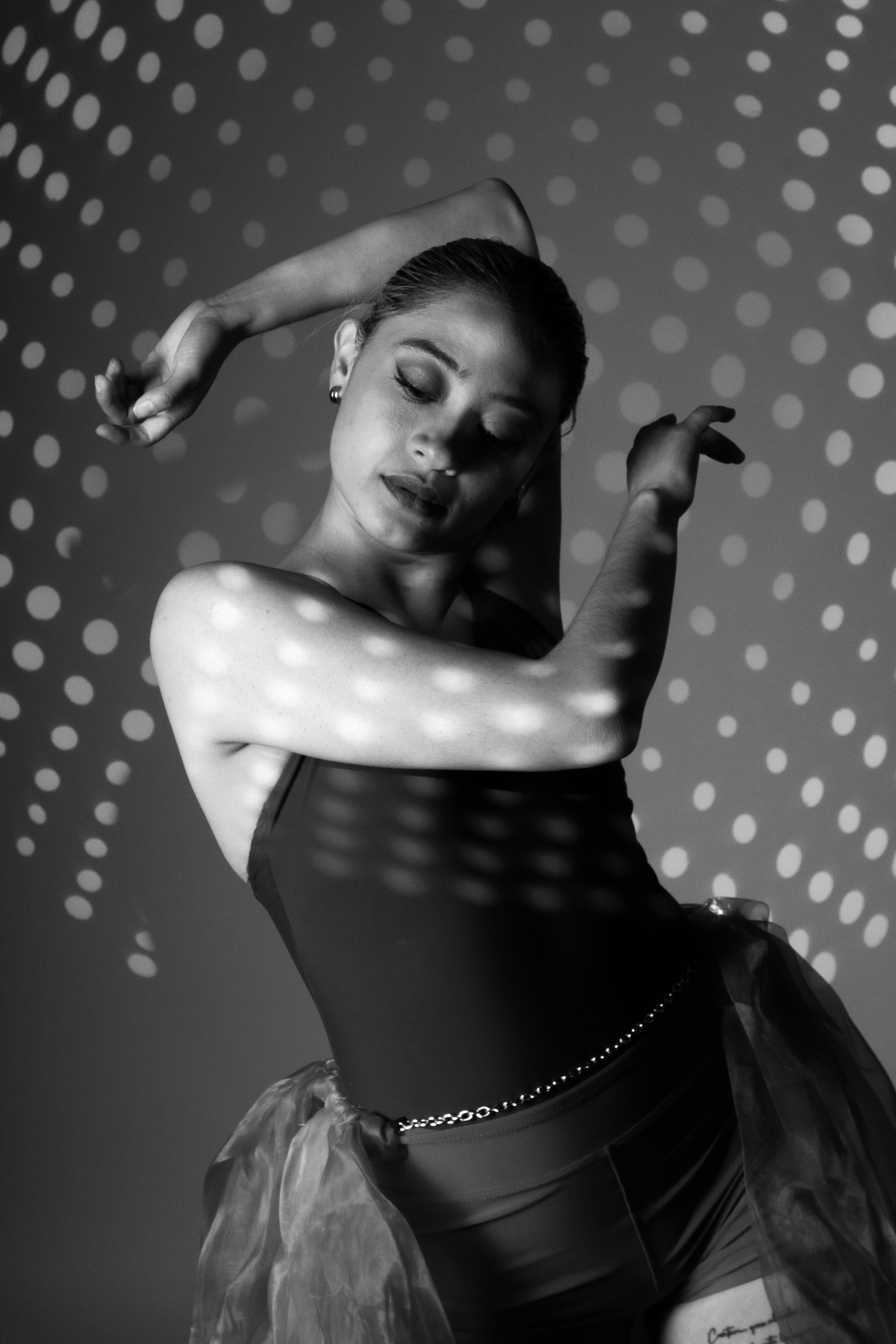 Elegant Ballet Dancer in Dramatic Spotlight · Free Stock Photo