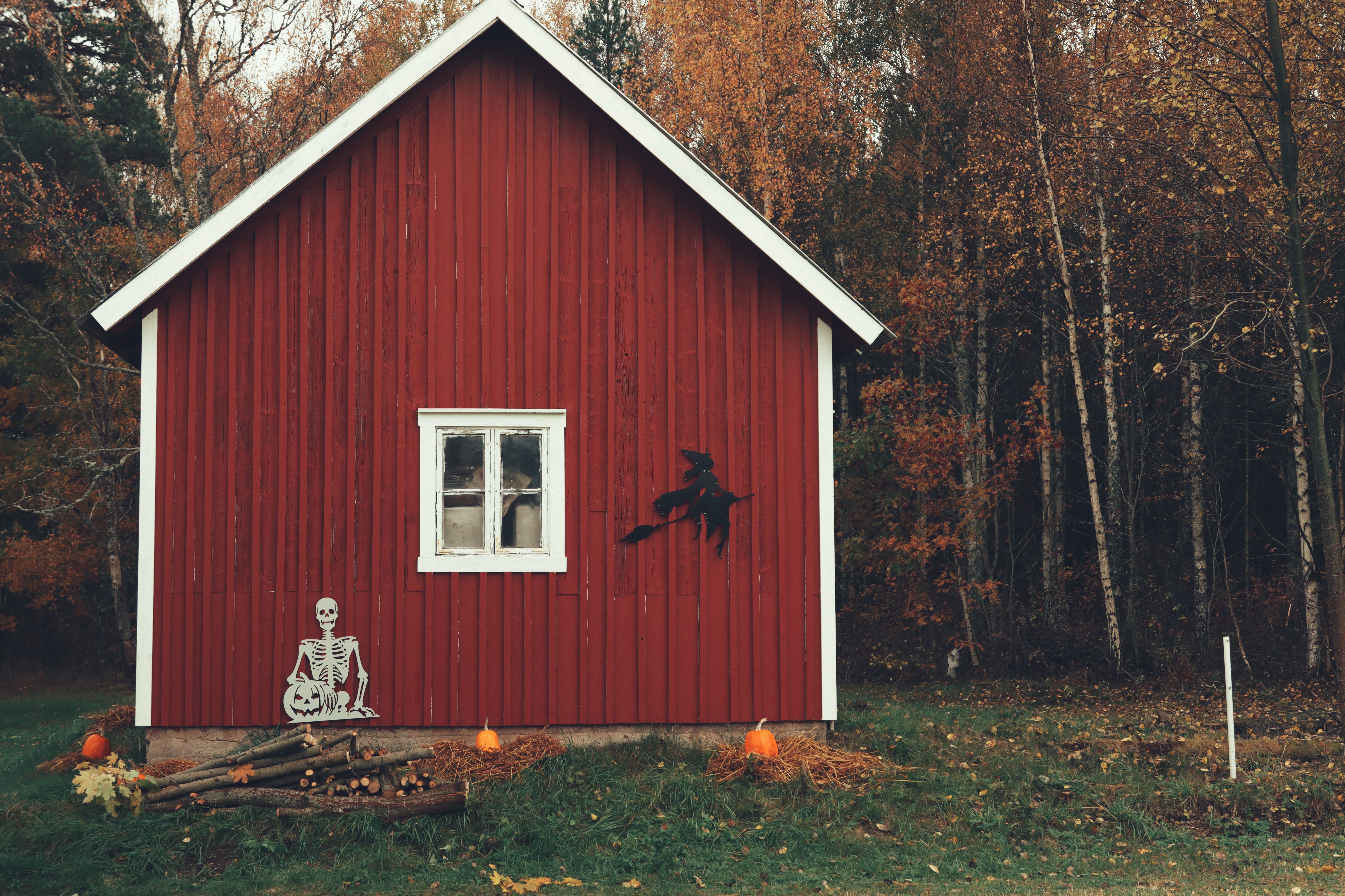 Red Swedish House Decorated for Halloween · Free Stock Photo