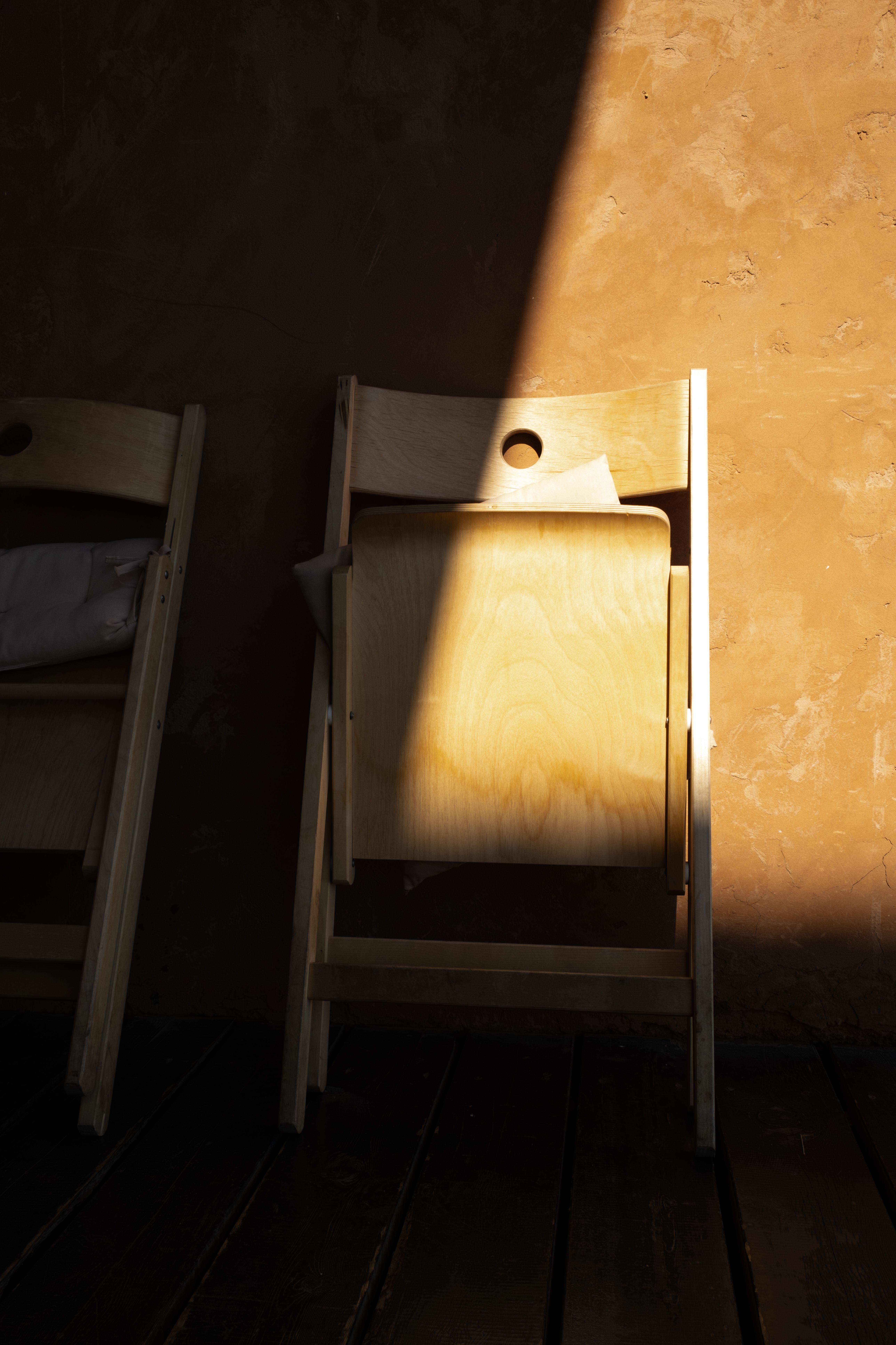 Wooden Chairs with Dramatic Shadows in Sunlight · Free Stock Photo