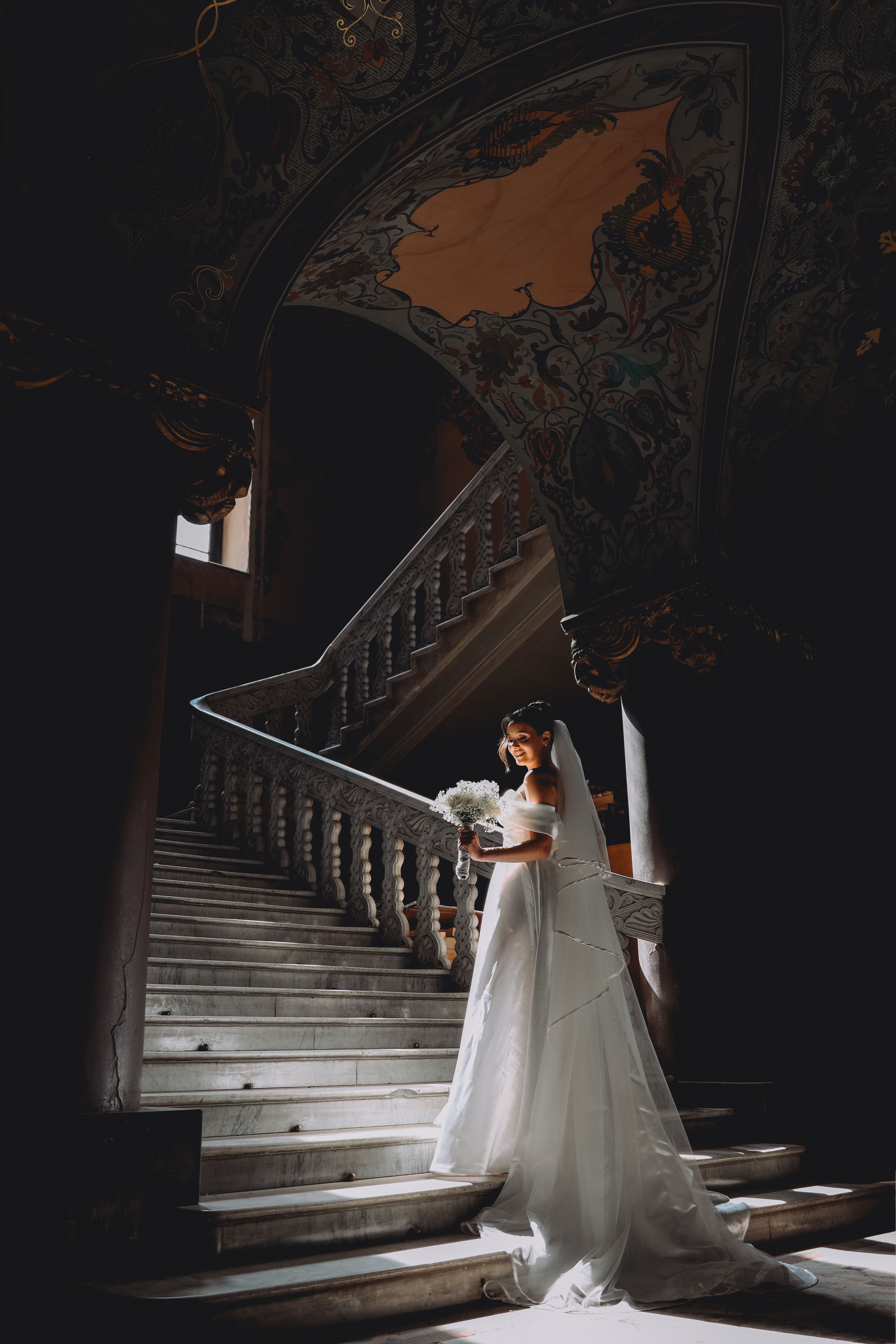The Bride Standing Inside a Building with Mosaics · Free Stock Photo
