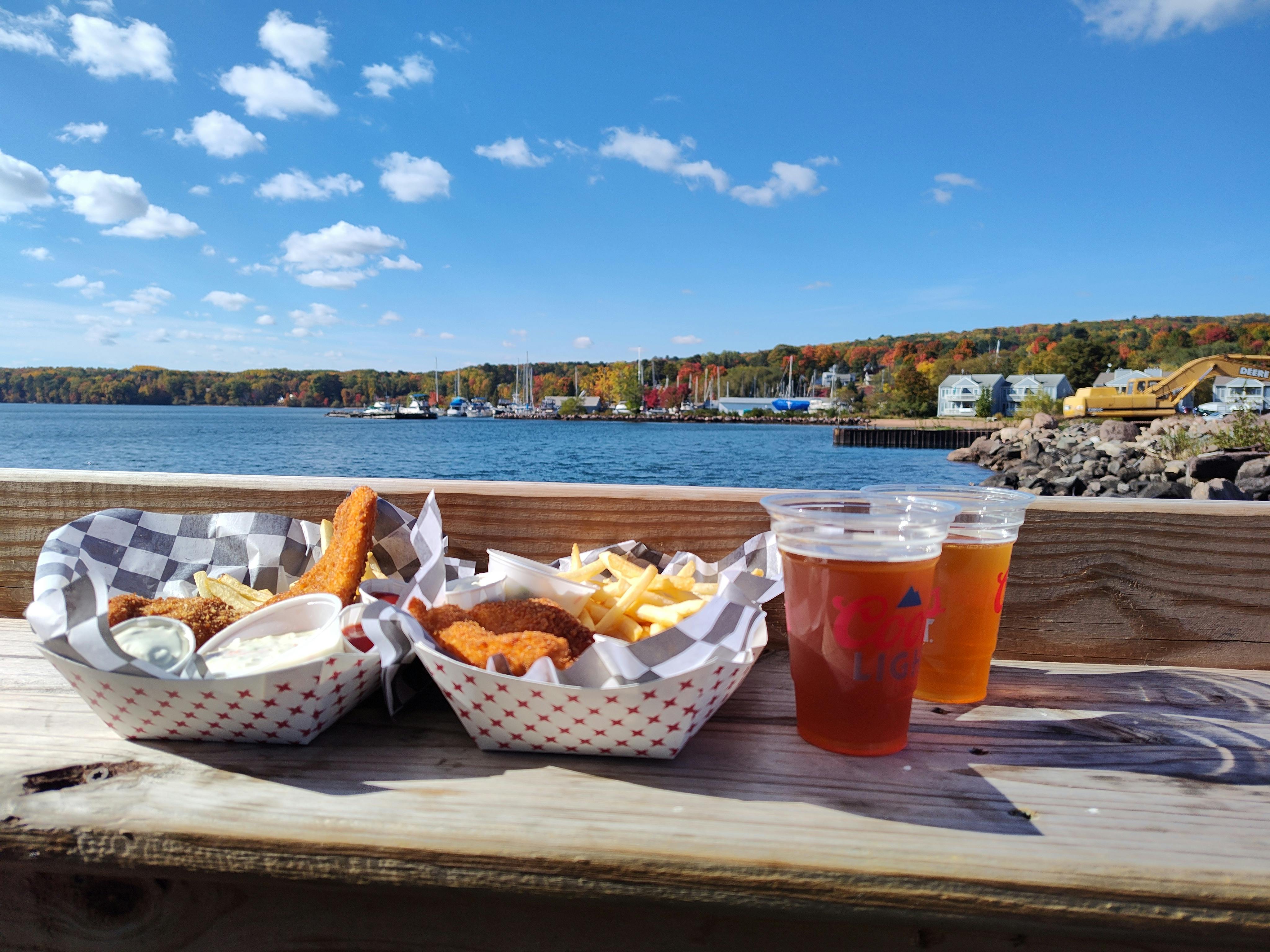 Scenic Lakeside Snack with Beer and Fries · Free Stock Photo