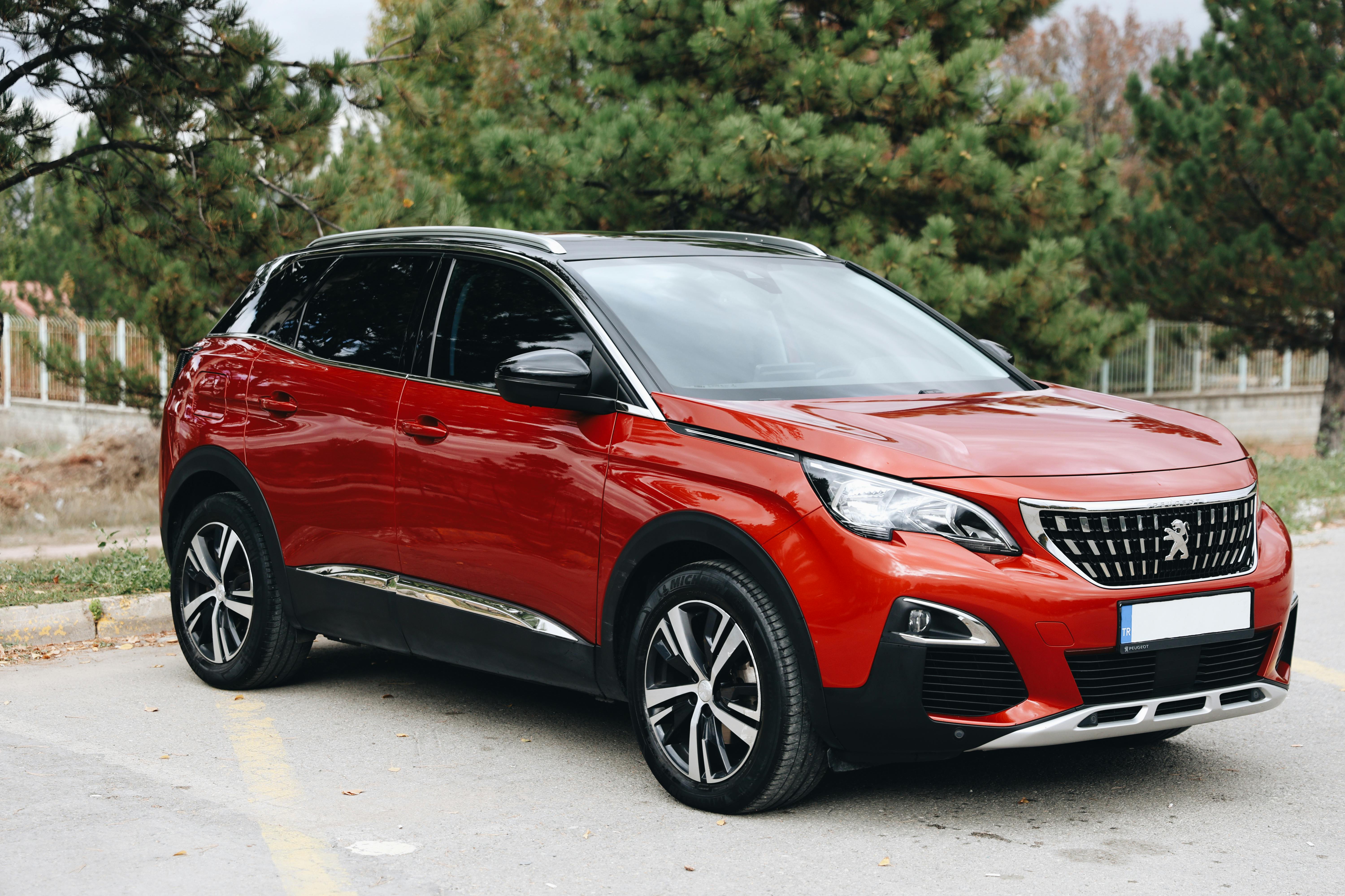 Red SUV in Scenic Outdoor Setting Sivas · Free Stock Photo