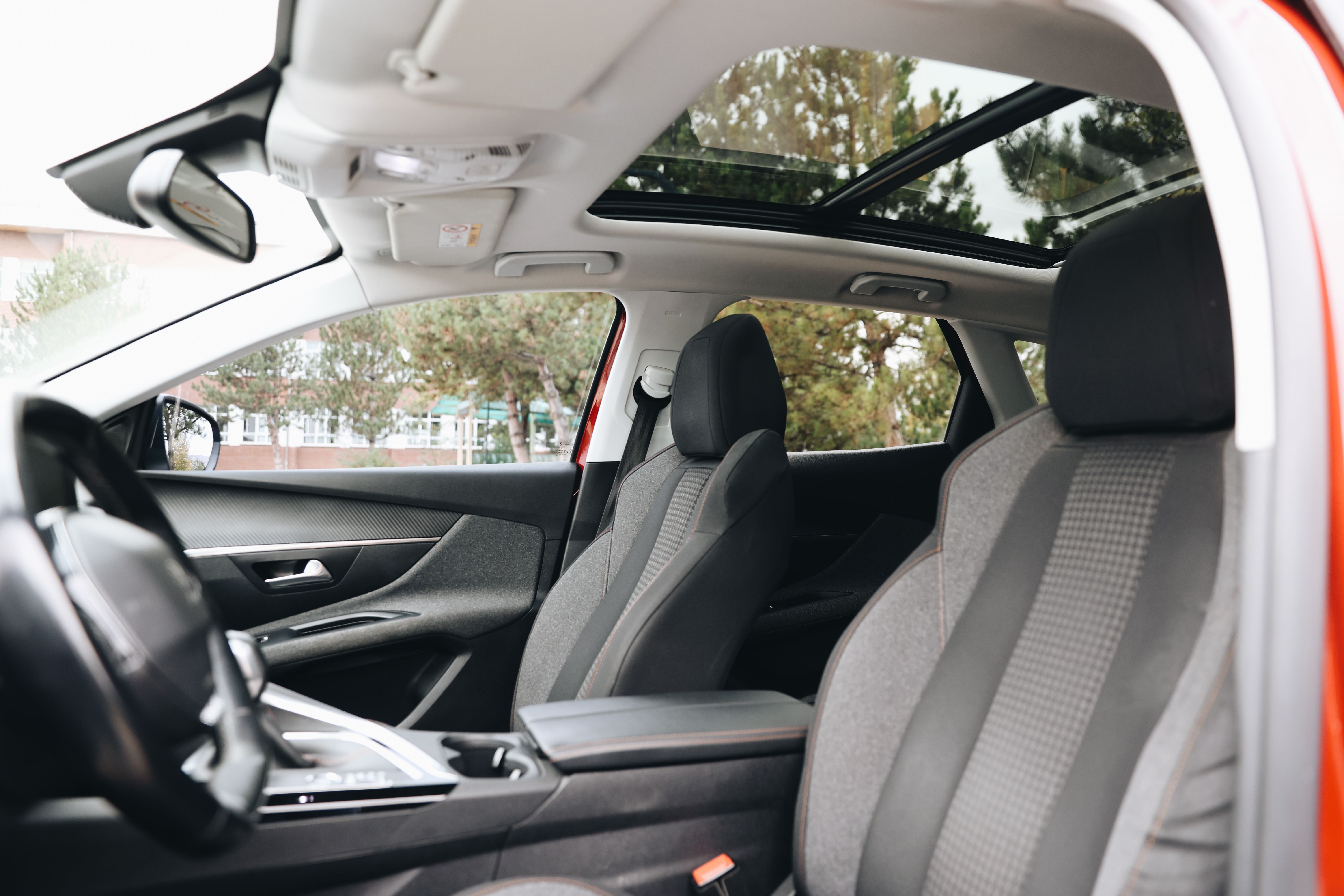 Modern Car Interior with Sunroof View · Free Stock Photo