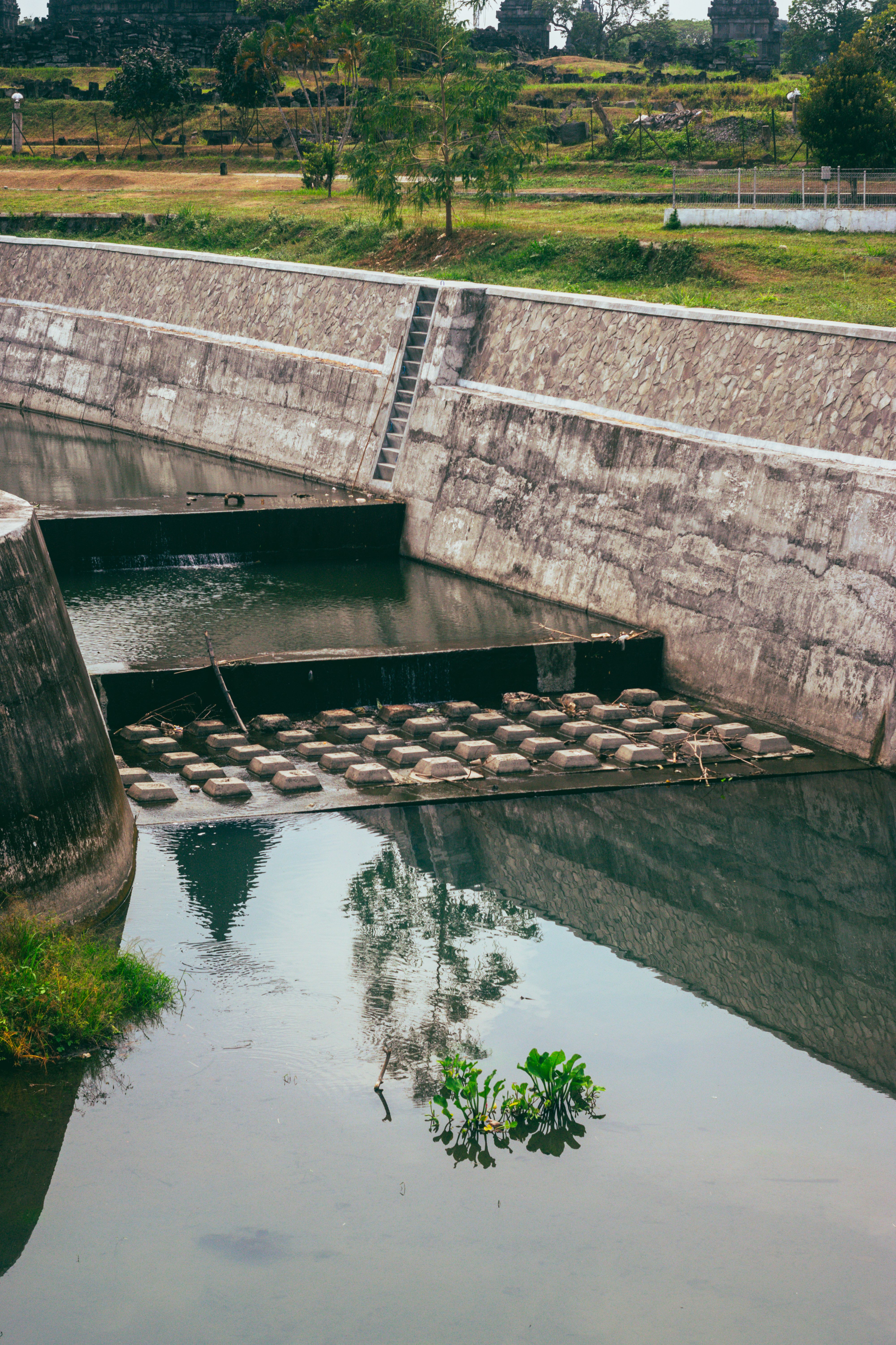 Concrete Canal with Reflections in Yogyakarta · Free Stock Photo