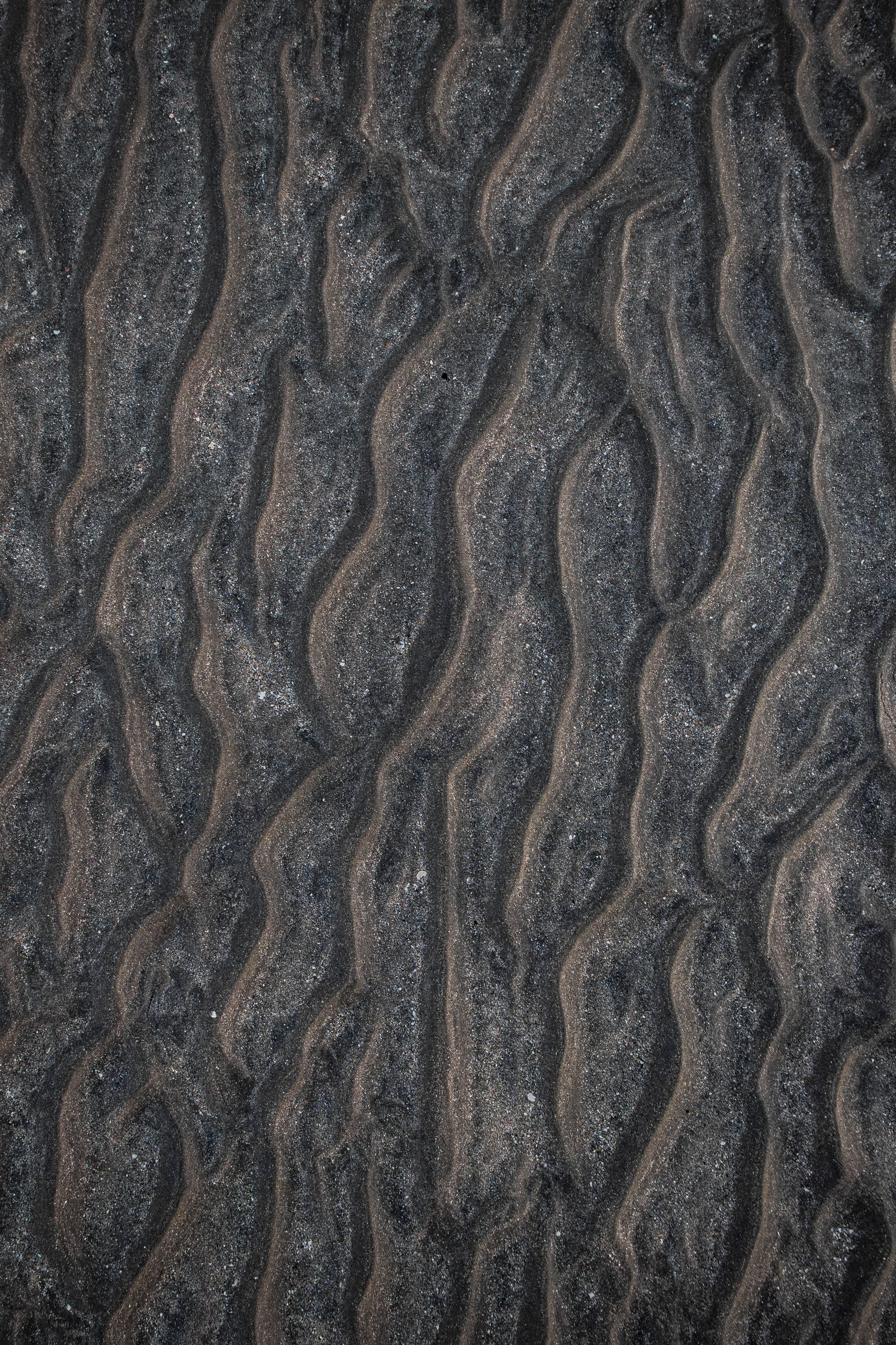 Natural Abstract Dark Sand Texture on Beach · Free Stock Photo