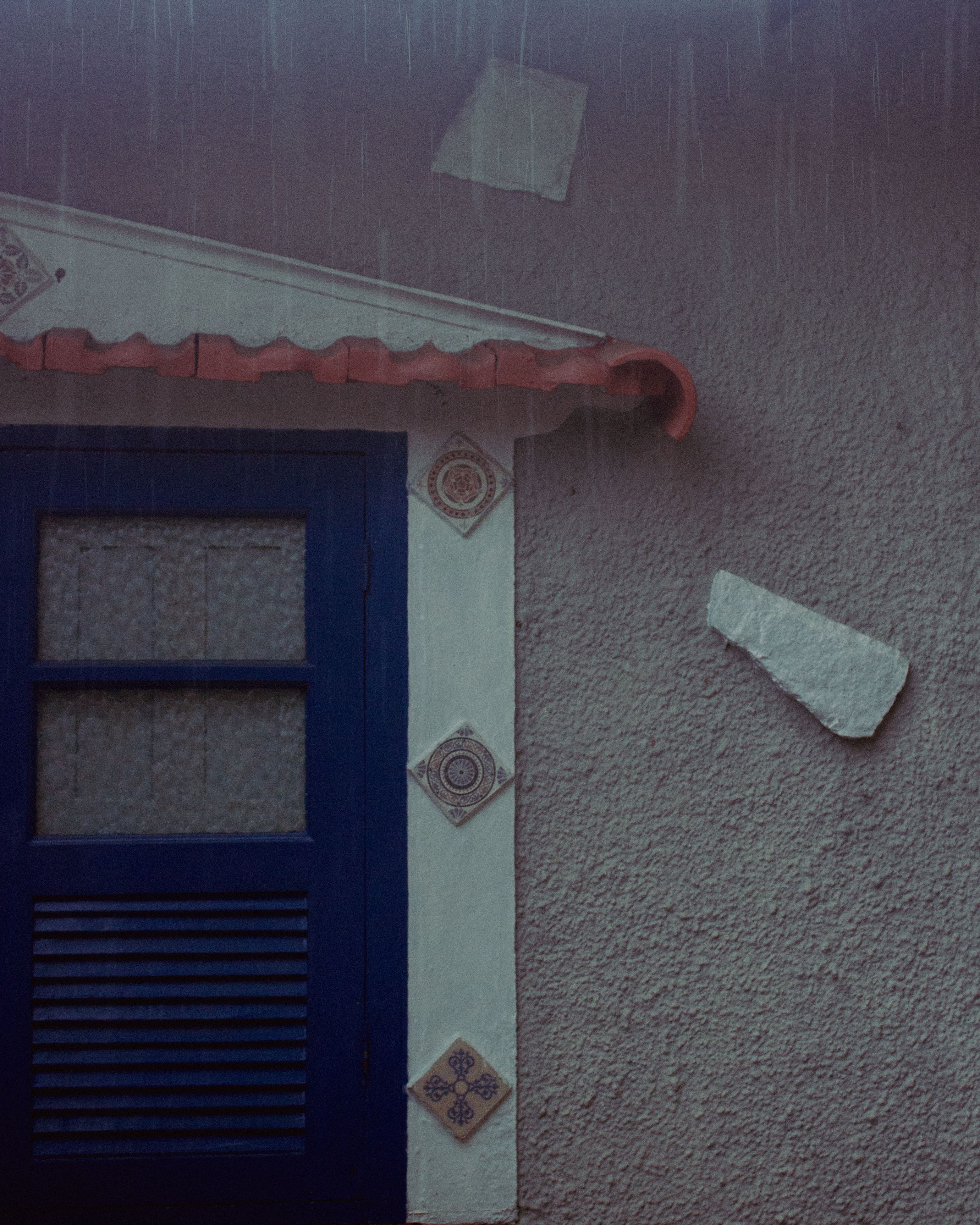 Old Door with Blue Frame in Rainy Weather · Free Stock Photo