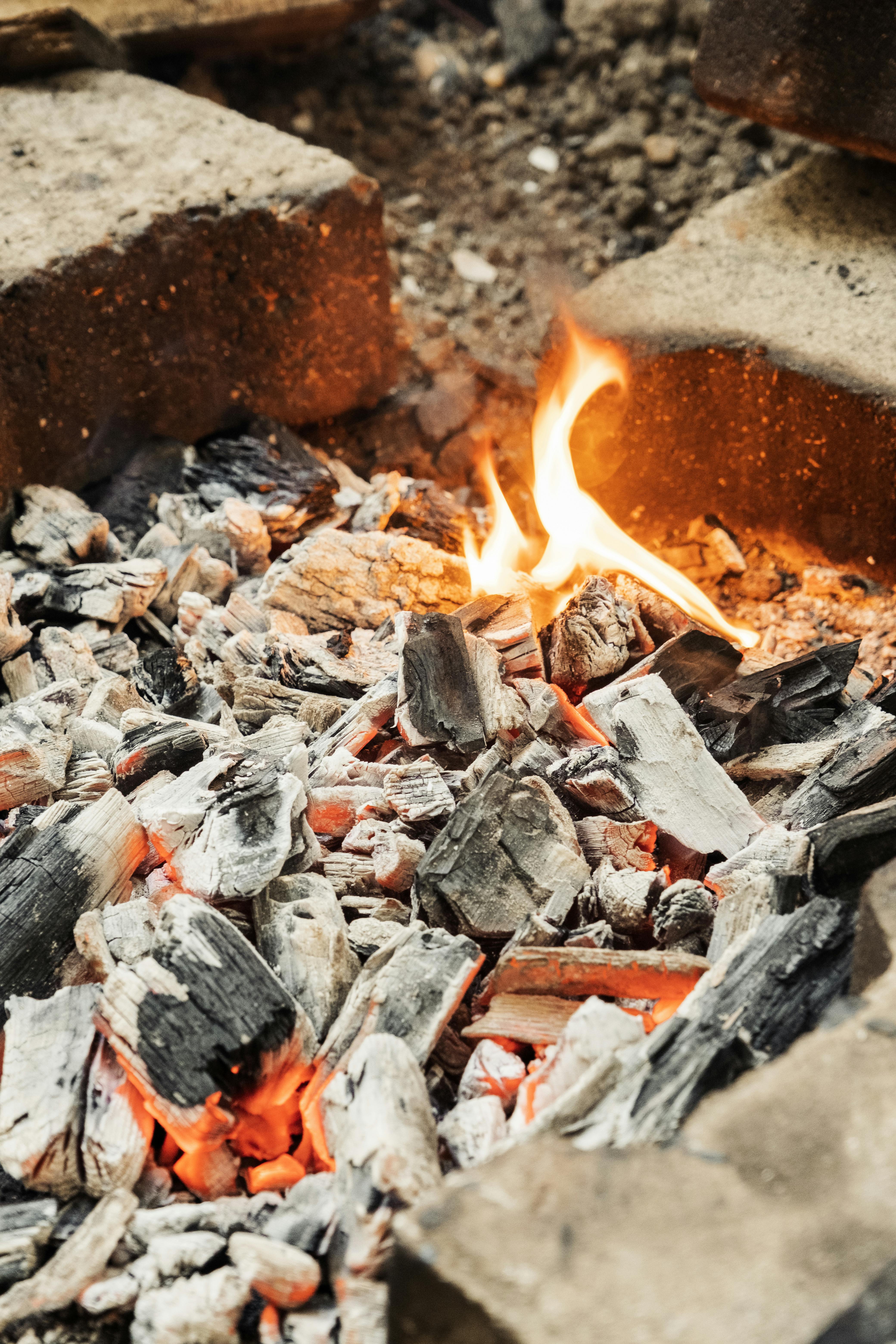 Glowing Embers and Flames in Outdoor Fire Pit · Free Stock Photo