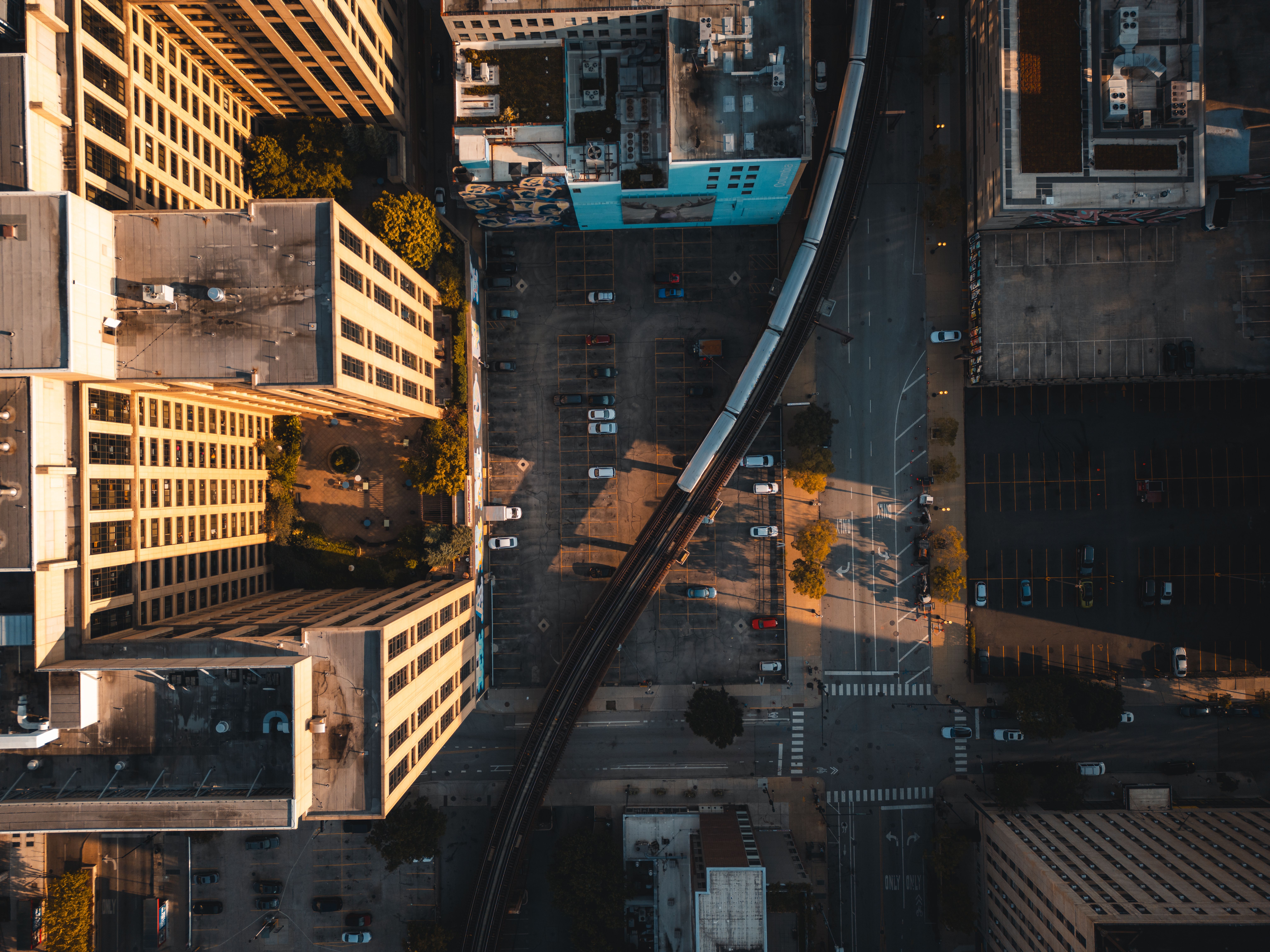 Aerial View of Urban Cityscape at Sunset · Free Stock Photo