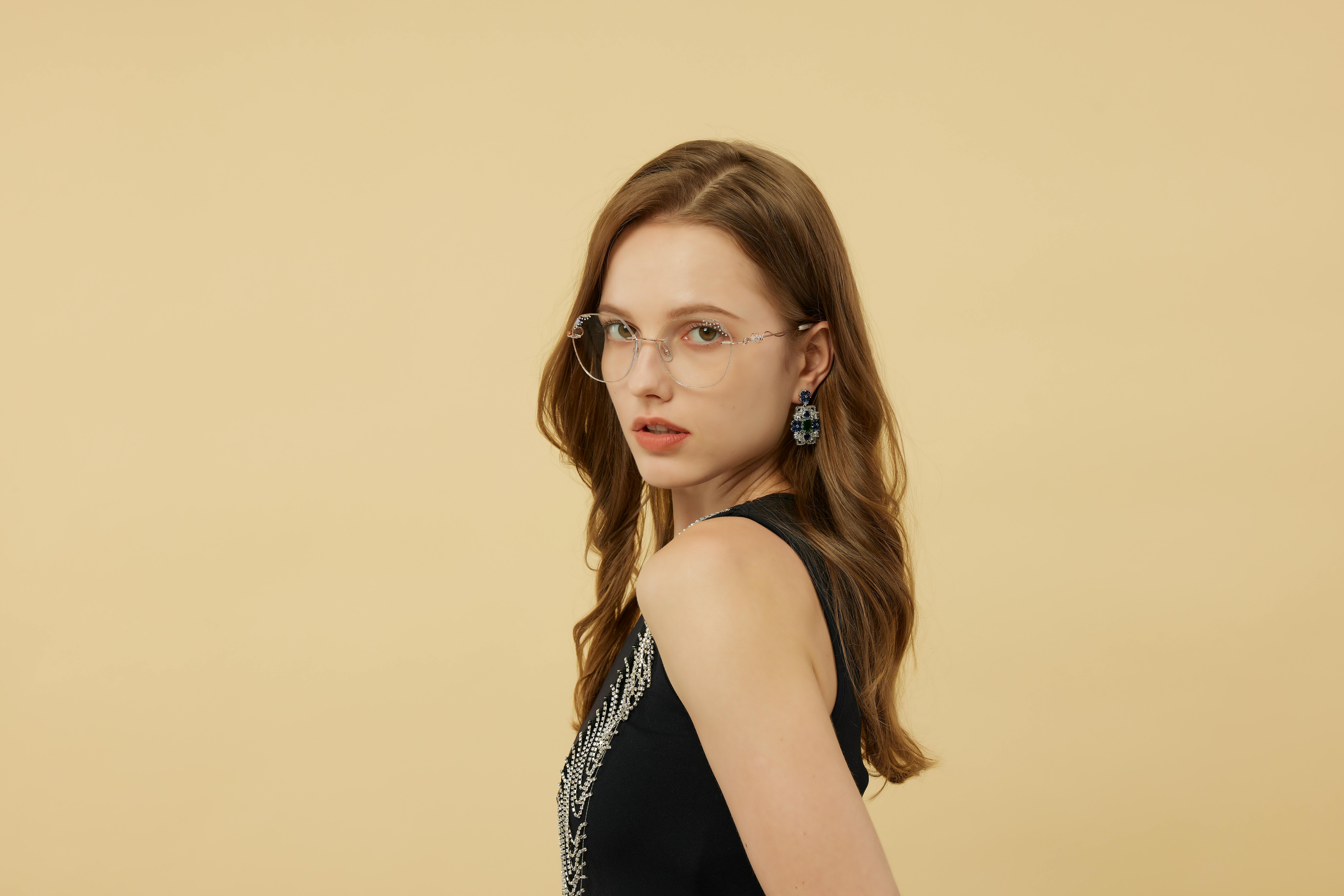 Stylish Woman with Glasses and Earrings · Free Stock Photo