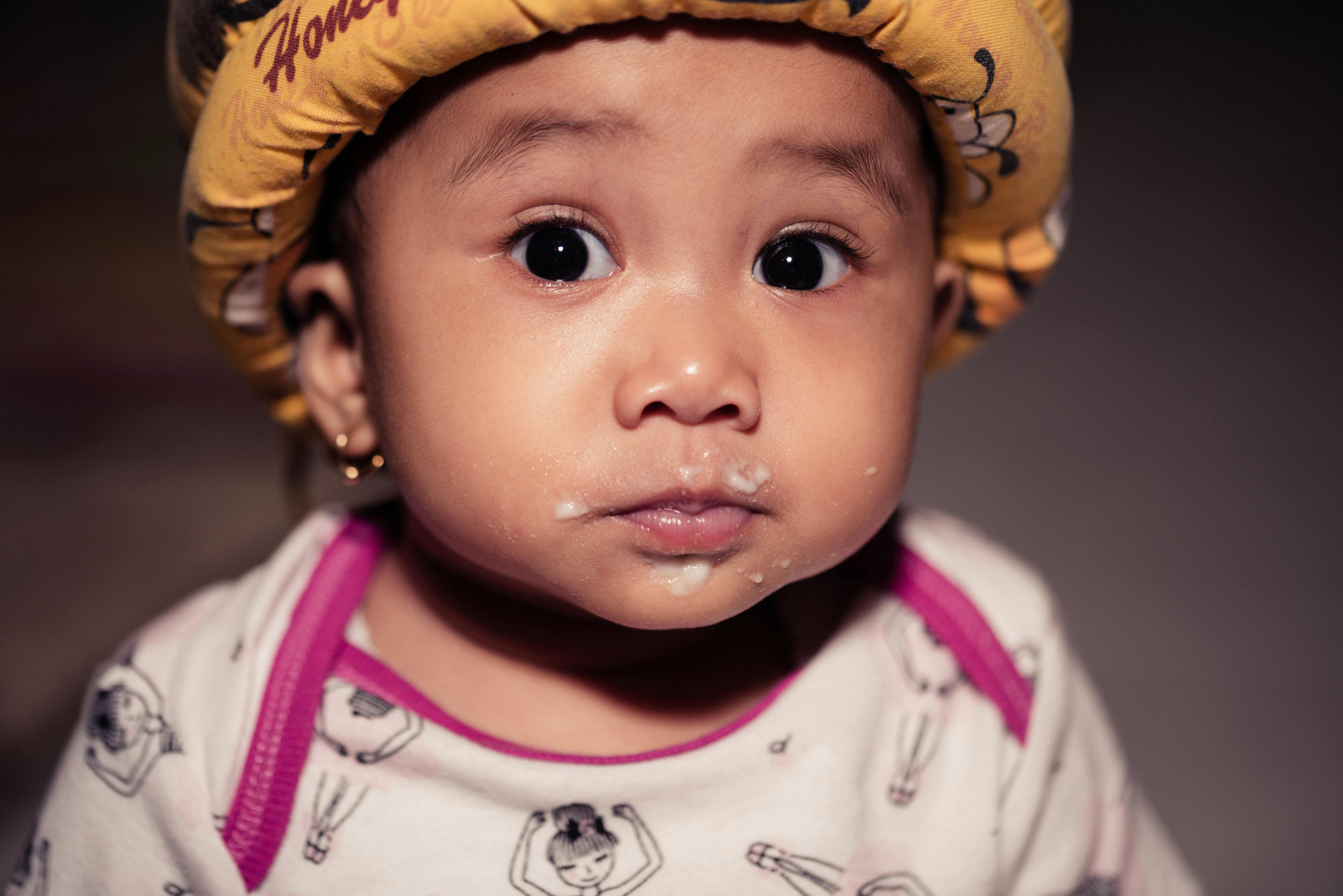 Adorable Baby with Food-Stained Face · Free Stock Photo