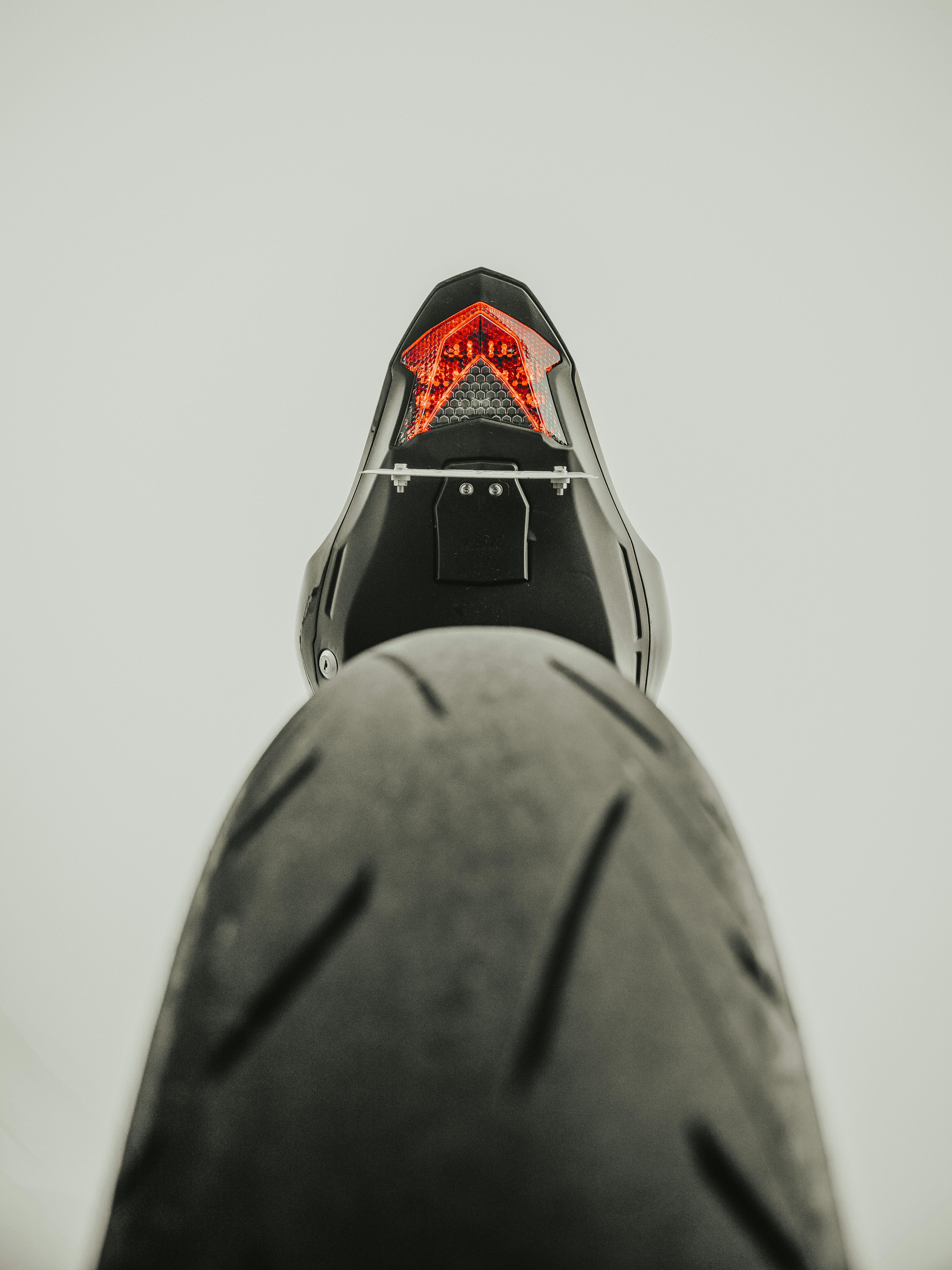 Close-up of a Motorcycle Rear Tire and Tail Light · Free Stock Photo