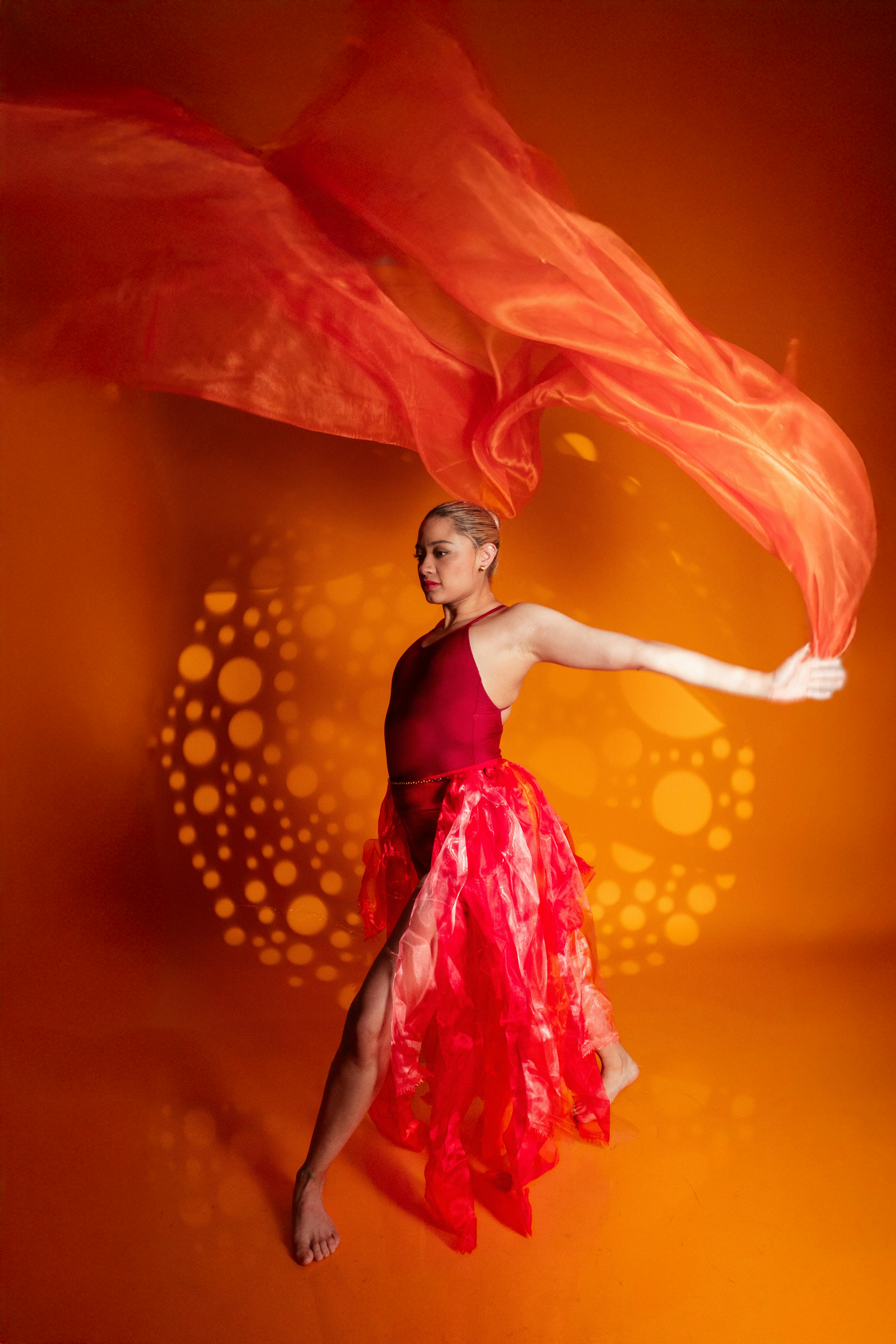 Dynamic Contemporary Dance with Flowing Red Fabric · Free Stock Photo