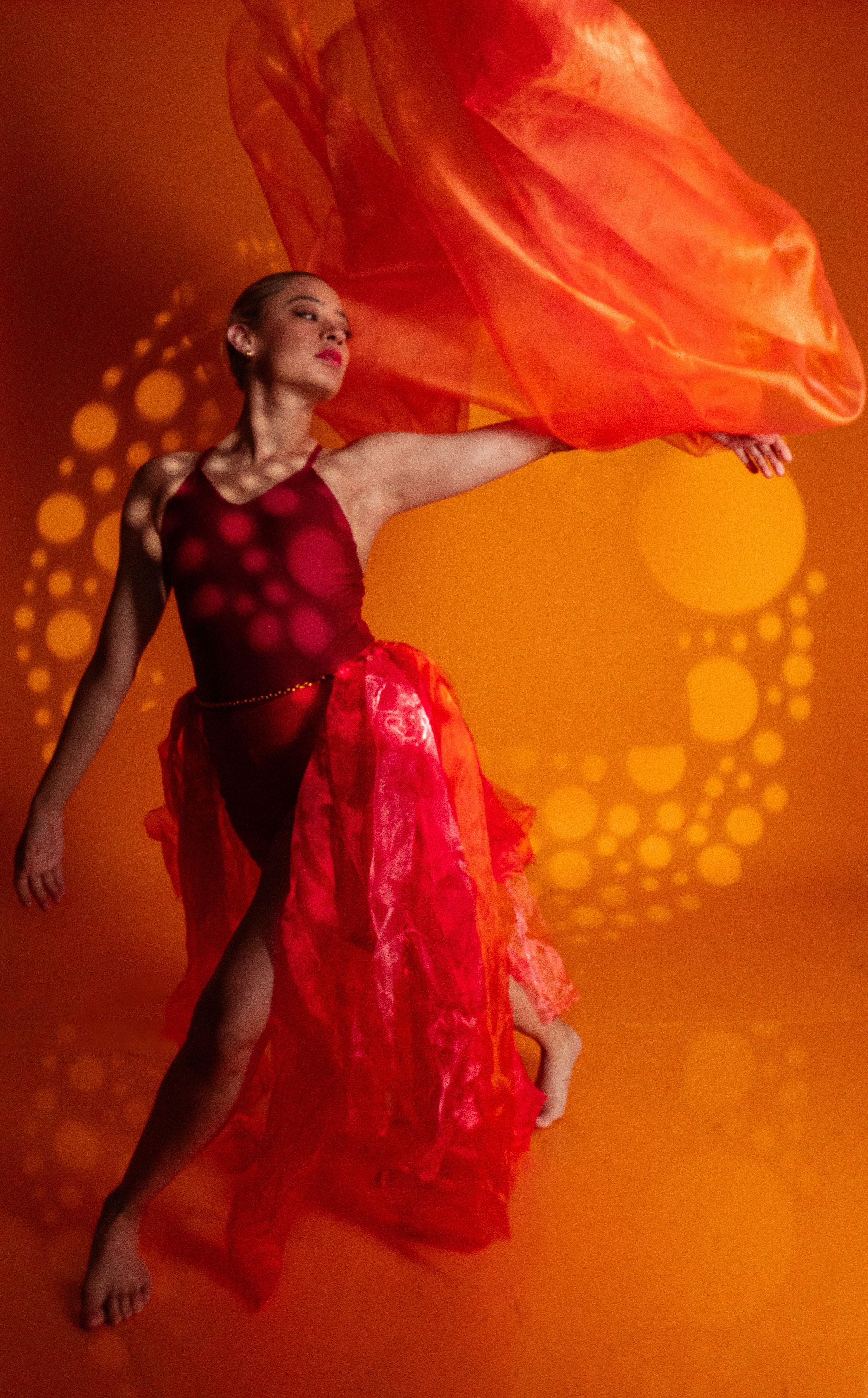 Vibrant Contemporary Dance with Orange Fabric · Free Stock Photo