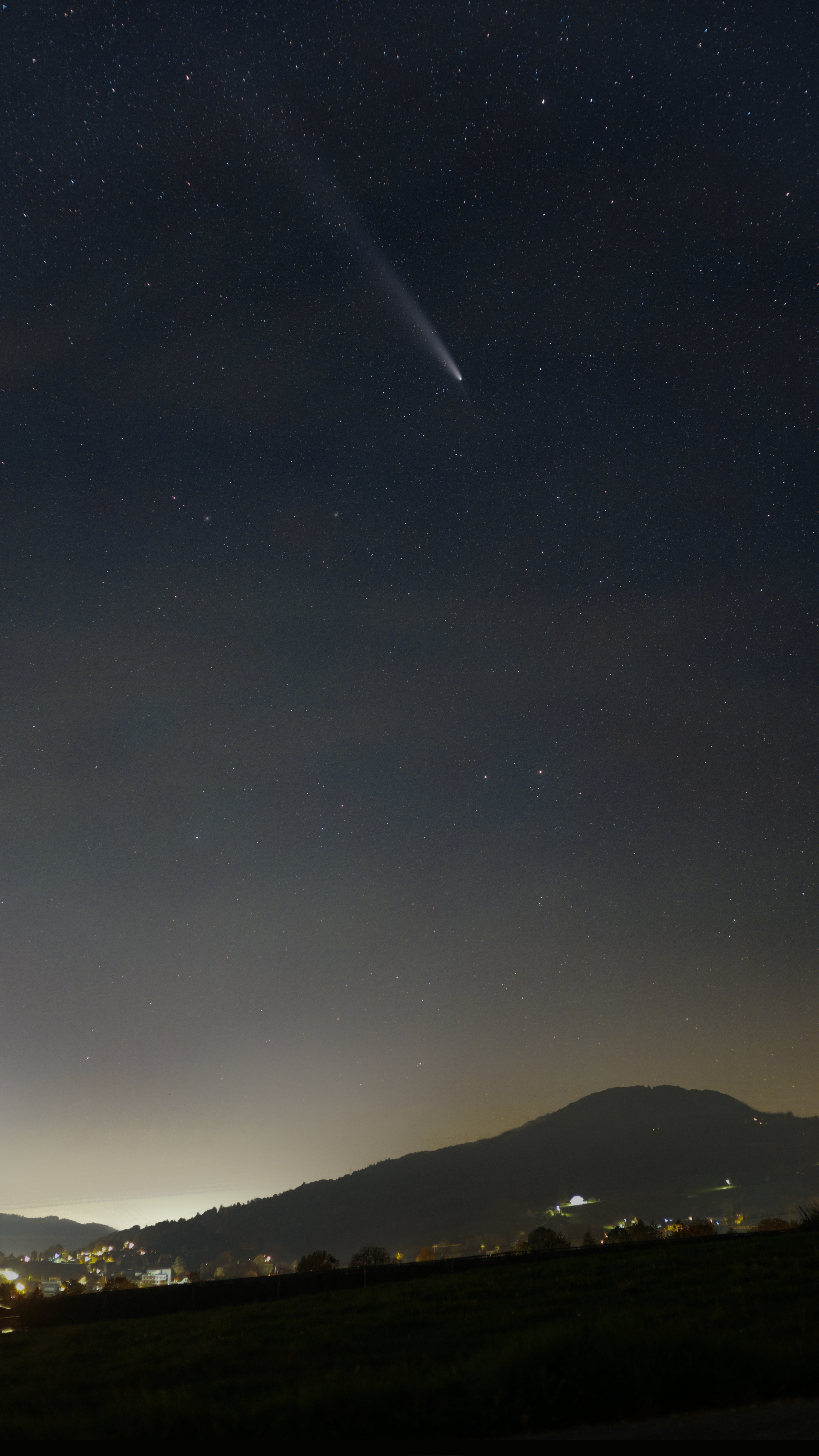 Stunning Night Sky with Comet over Swiss Landscape · Free Stock Photo