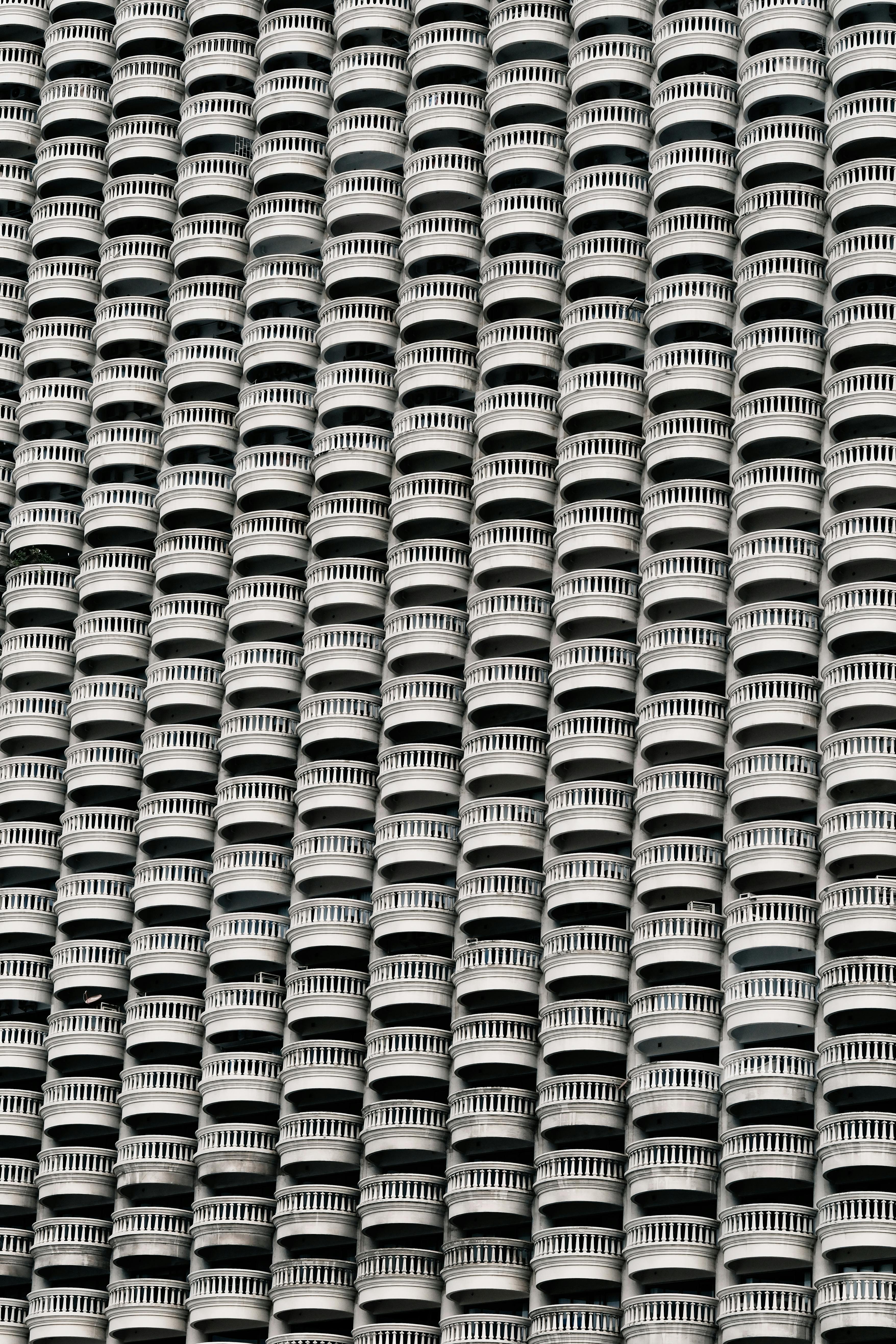Symmetrical High-Rise Building Facade Pattern · Free Stock Photo
