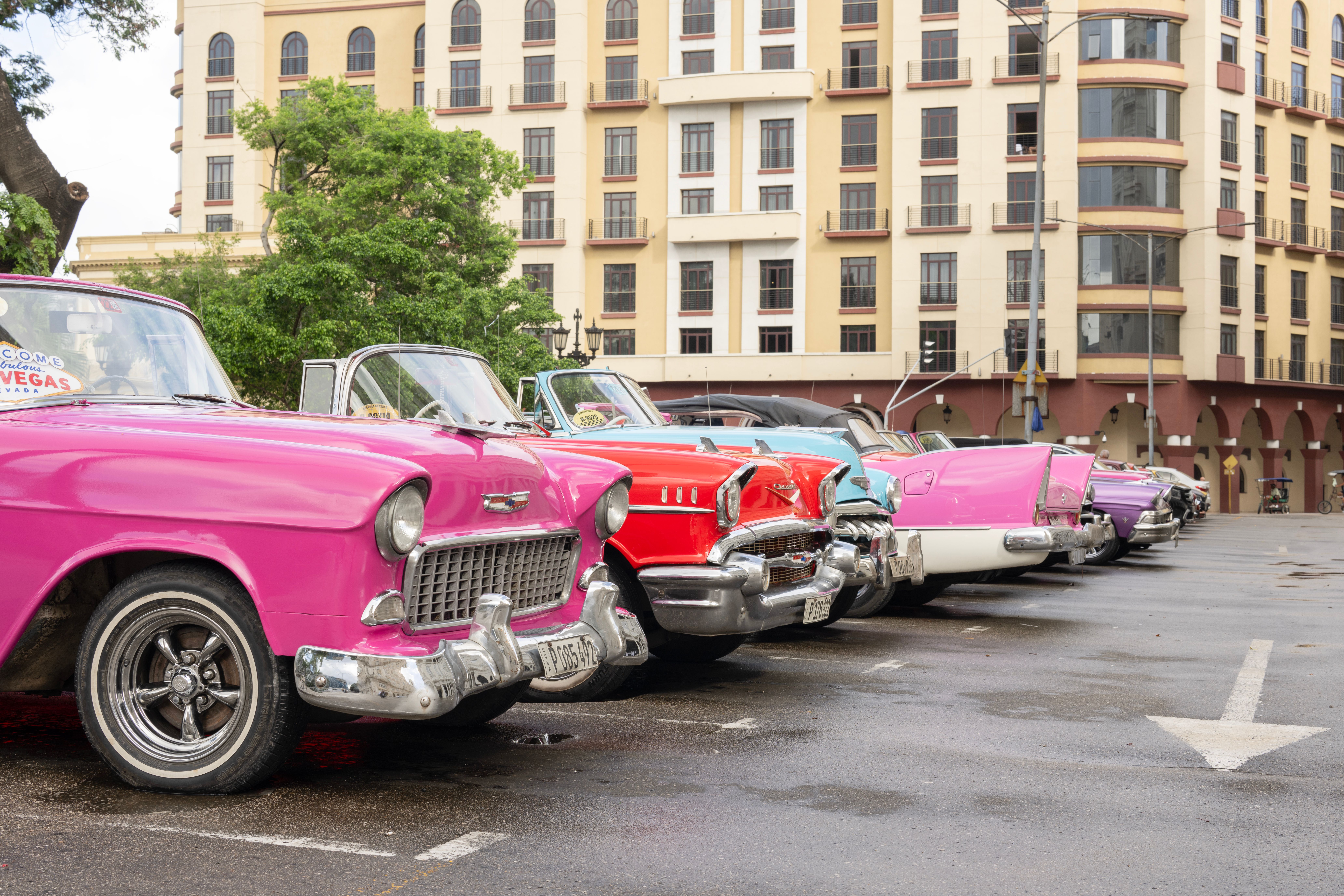 Grayscale Photography of Vintage Car Beside Pavement · Free Stock Photo