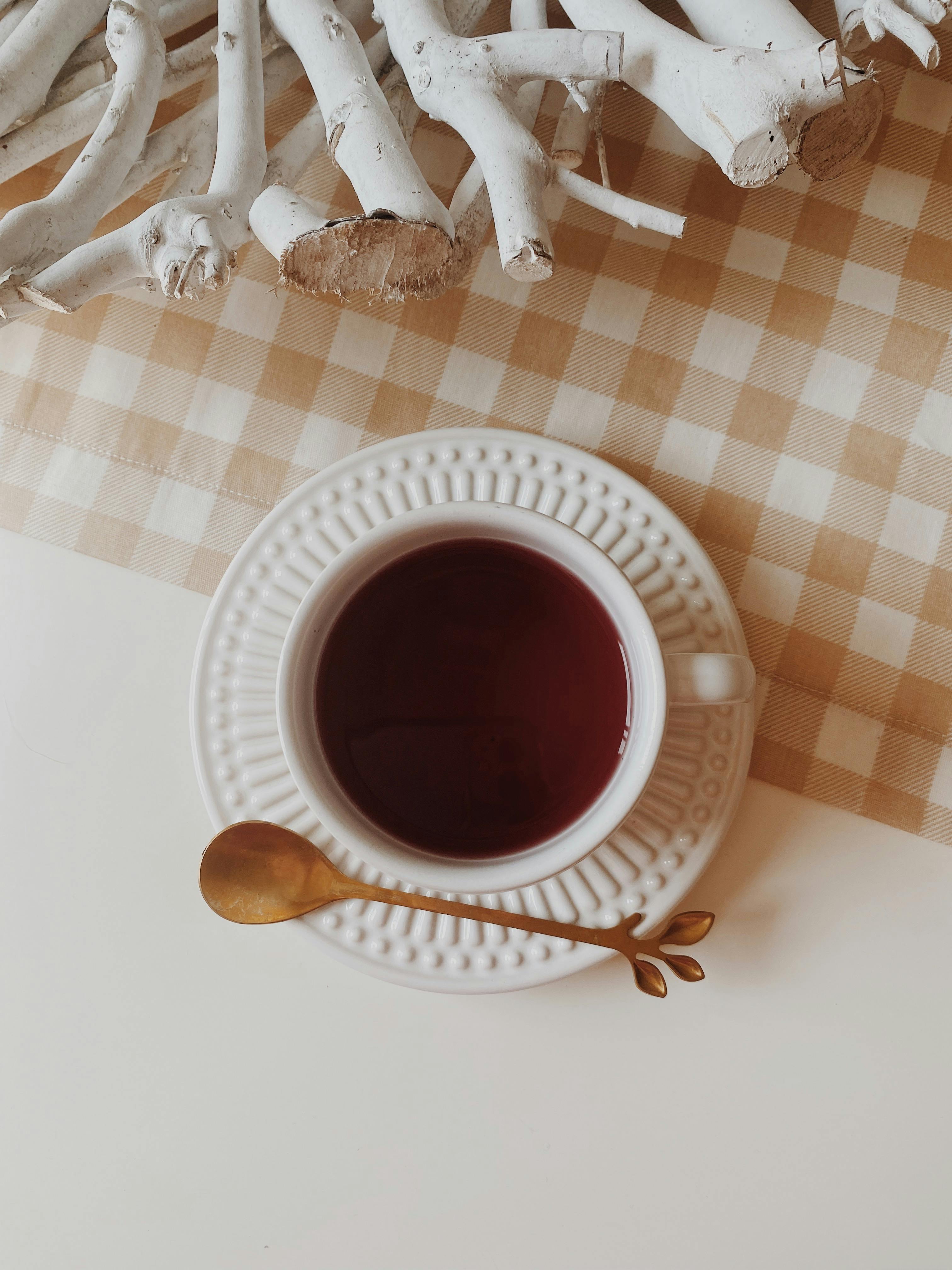 Elegant Overhead View of Tea on Checkered Tablecloth · Free Stock Photo