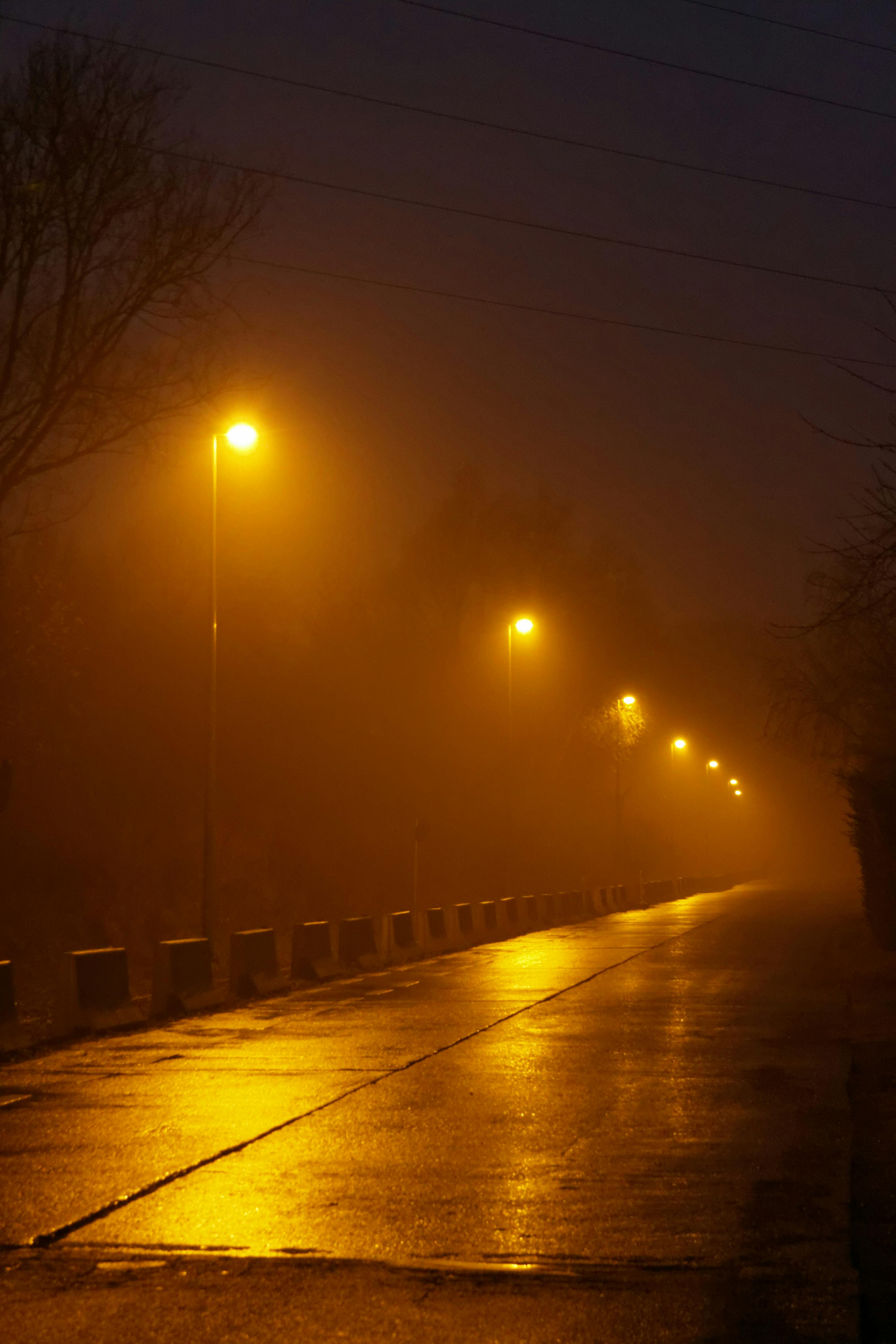 Dim Streetlight at Night in Fog · Free Stock Photo