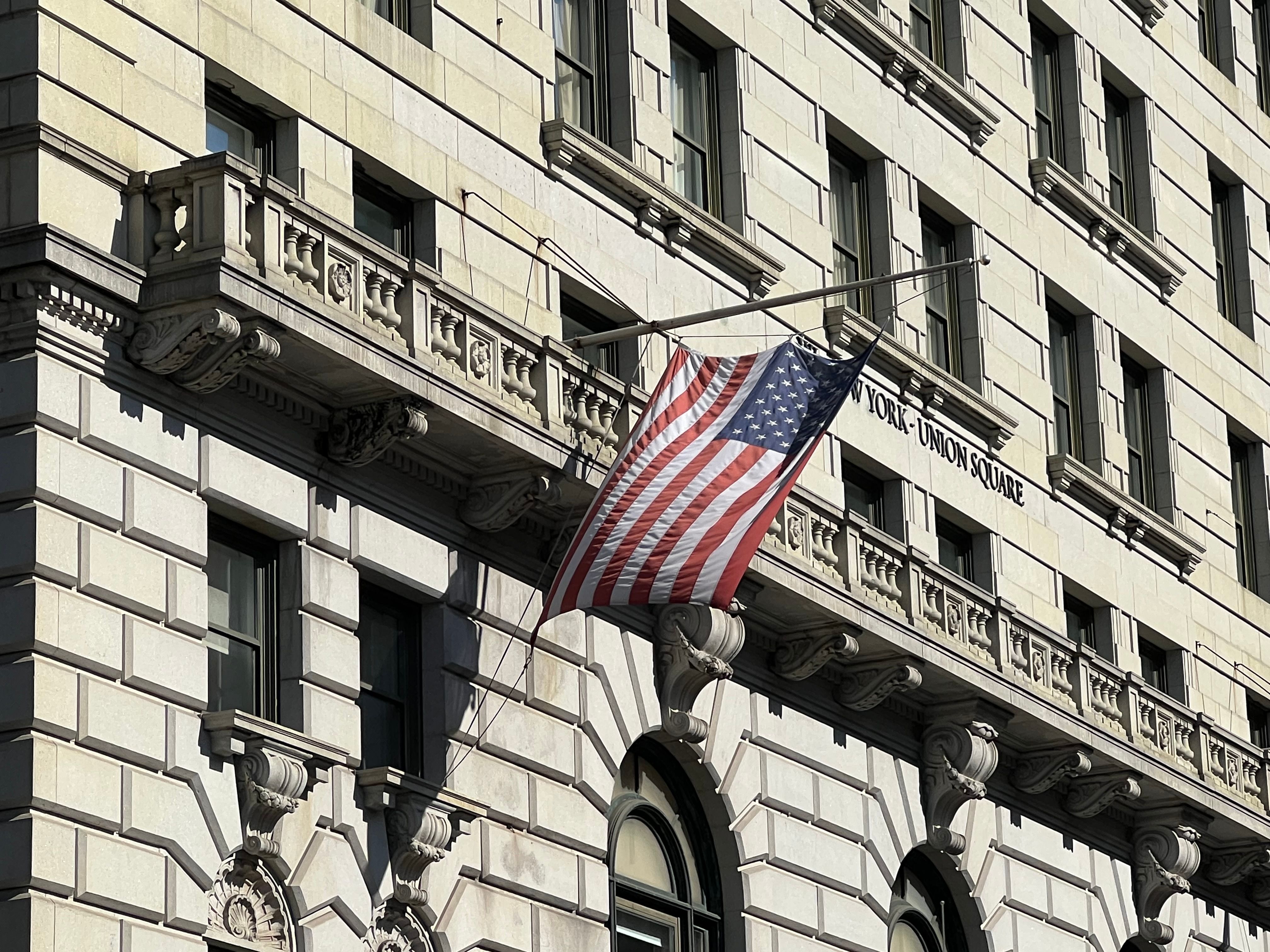 American Flag on Historic Union Square Building · Free Stock Photo