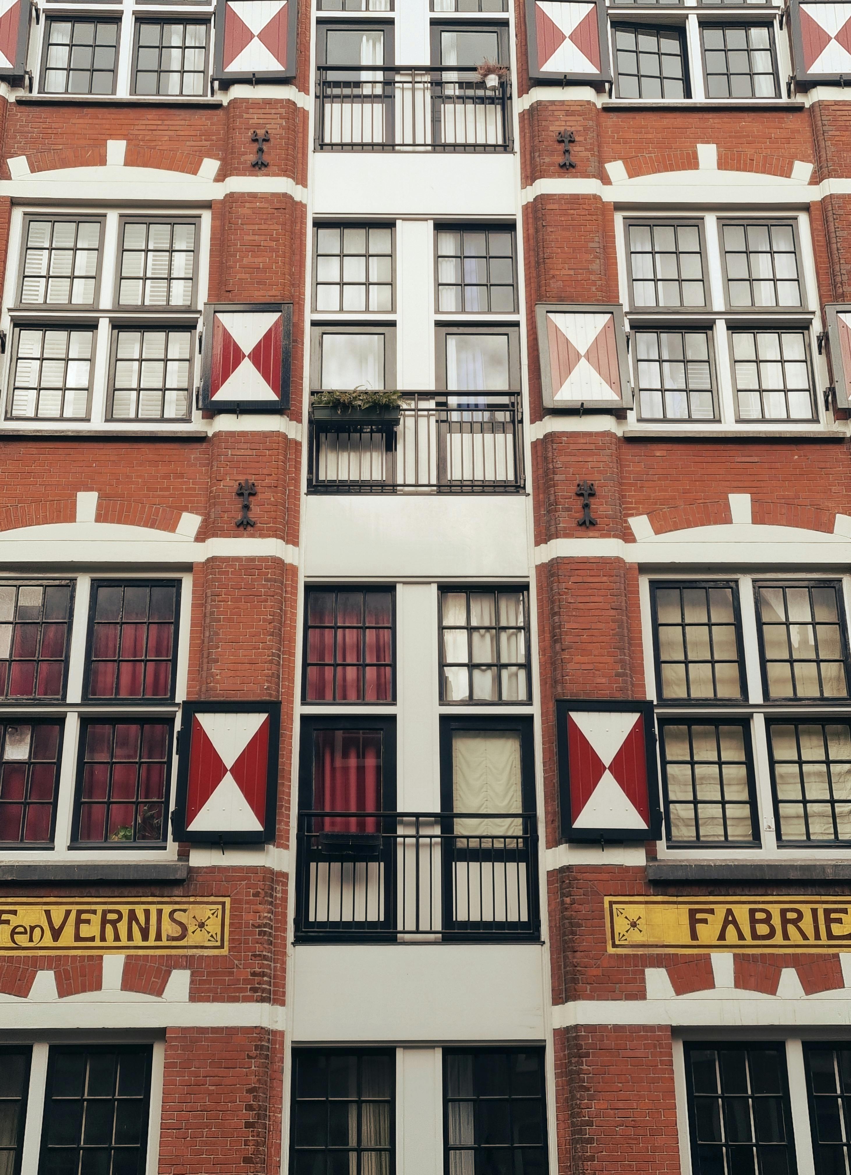 Charming Red Brick Building Facade with Distinctive Design · Free Stock ...