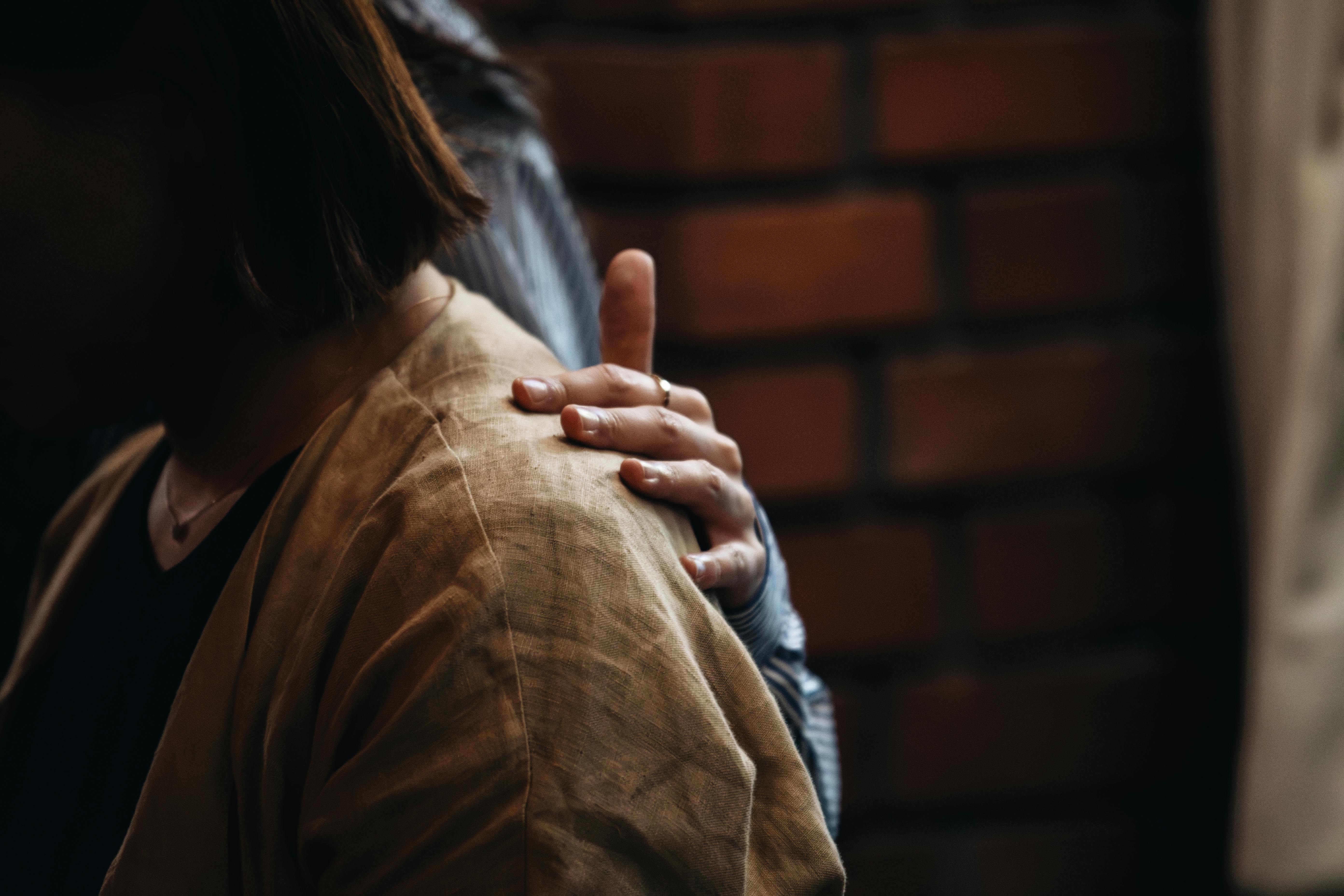 Comforting Hand on Shoulder - Emotional Support · Free Stock Photo