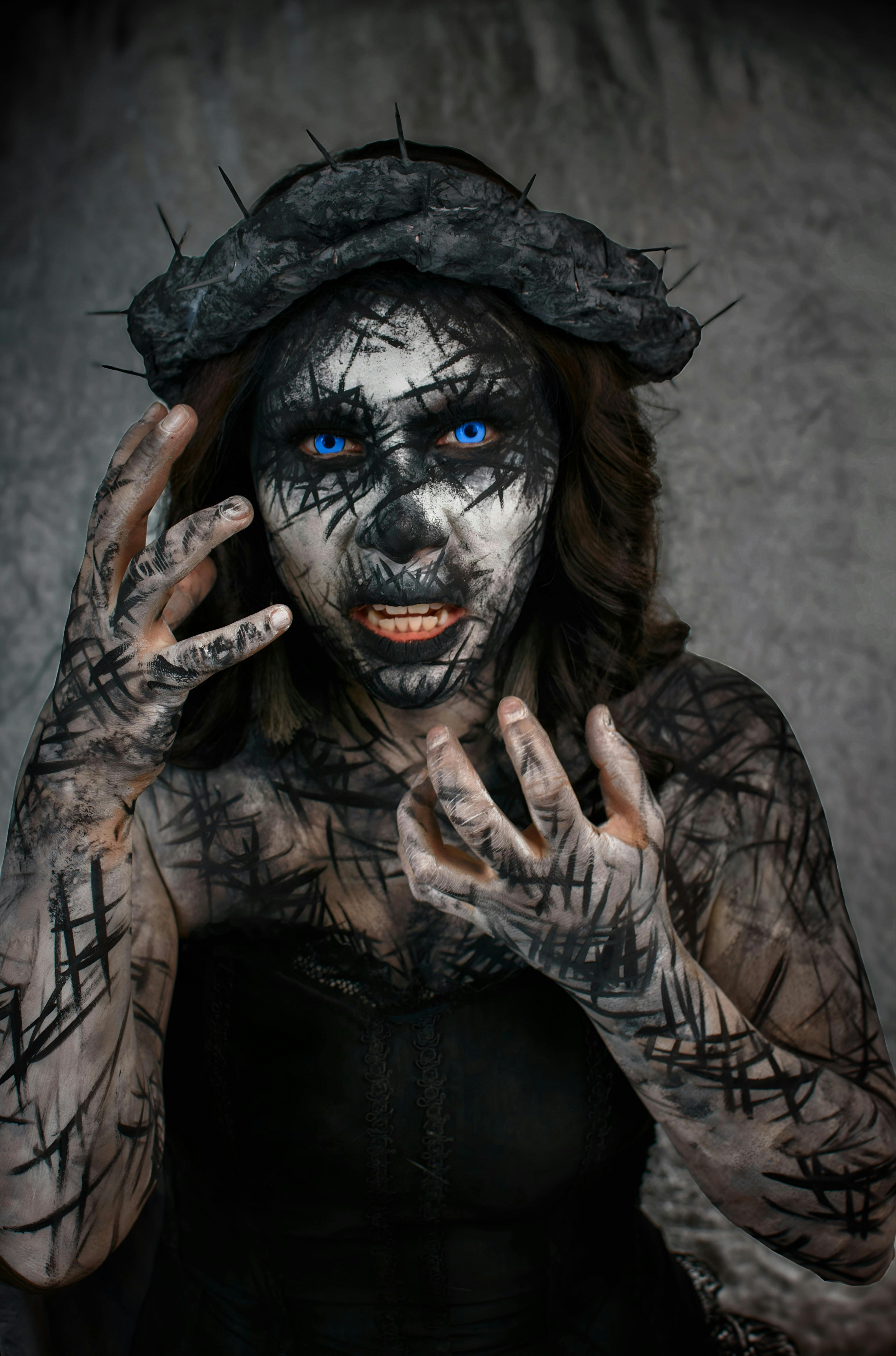 Spooky Female Character with Dramatic Makeup · Free Stock Photo
