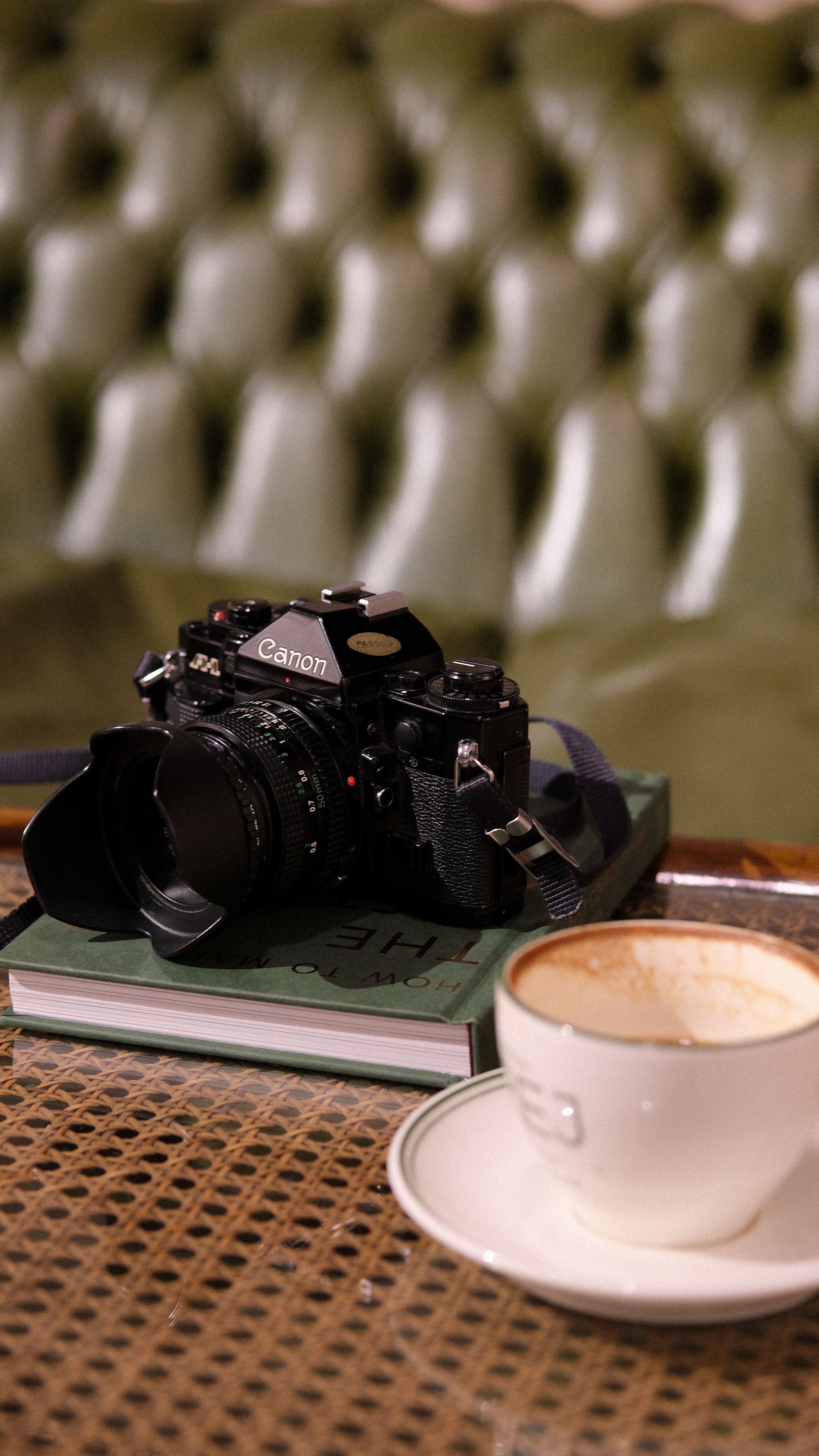 Vintage Camera and Coffee on a Table in Cozy Café · Free Stock Photo