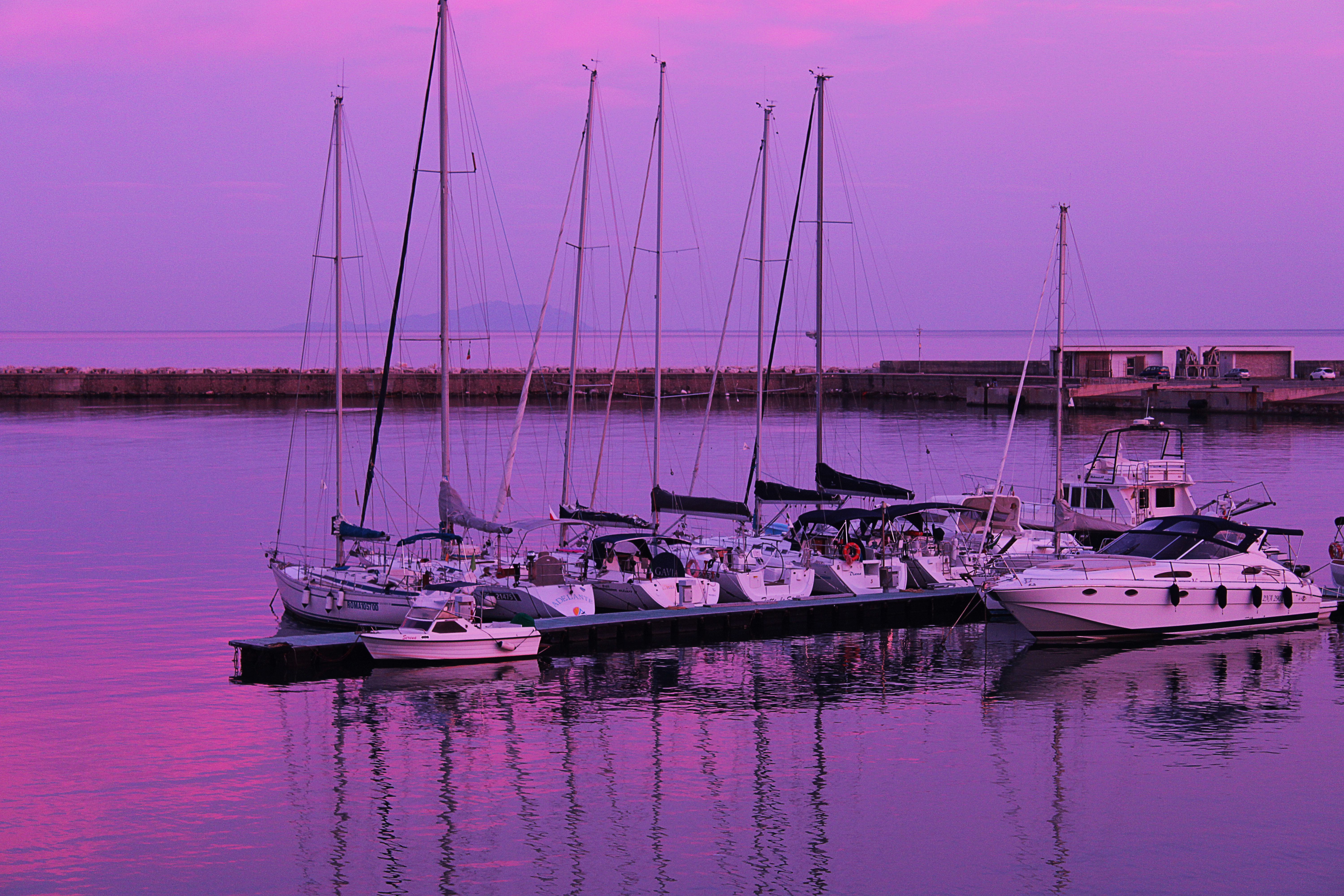 Serene Sunset Harbor with Docked Boats · Free Stock Photo