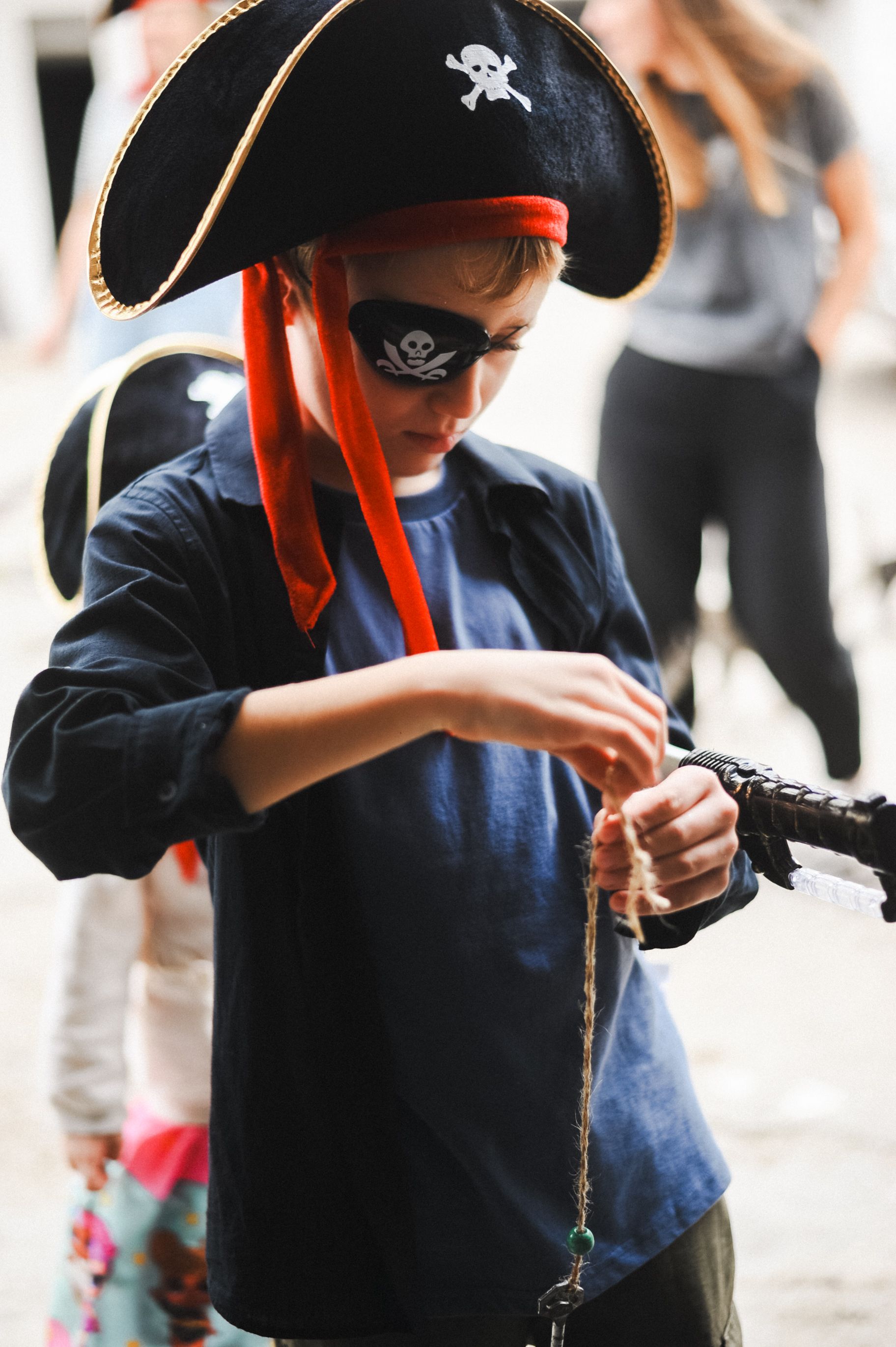 Child Dressed as Pirate at Outdoor Event · Free Stock Photo