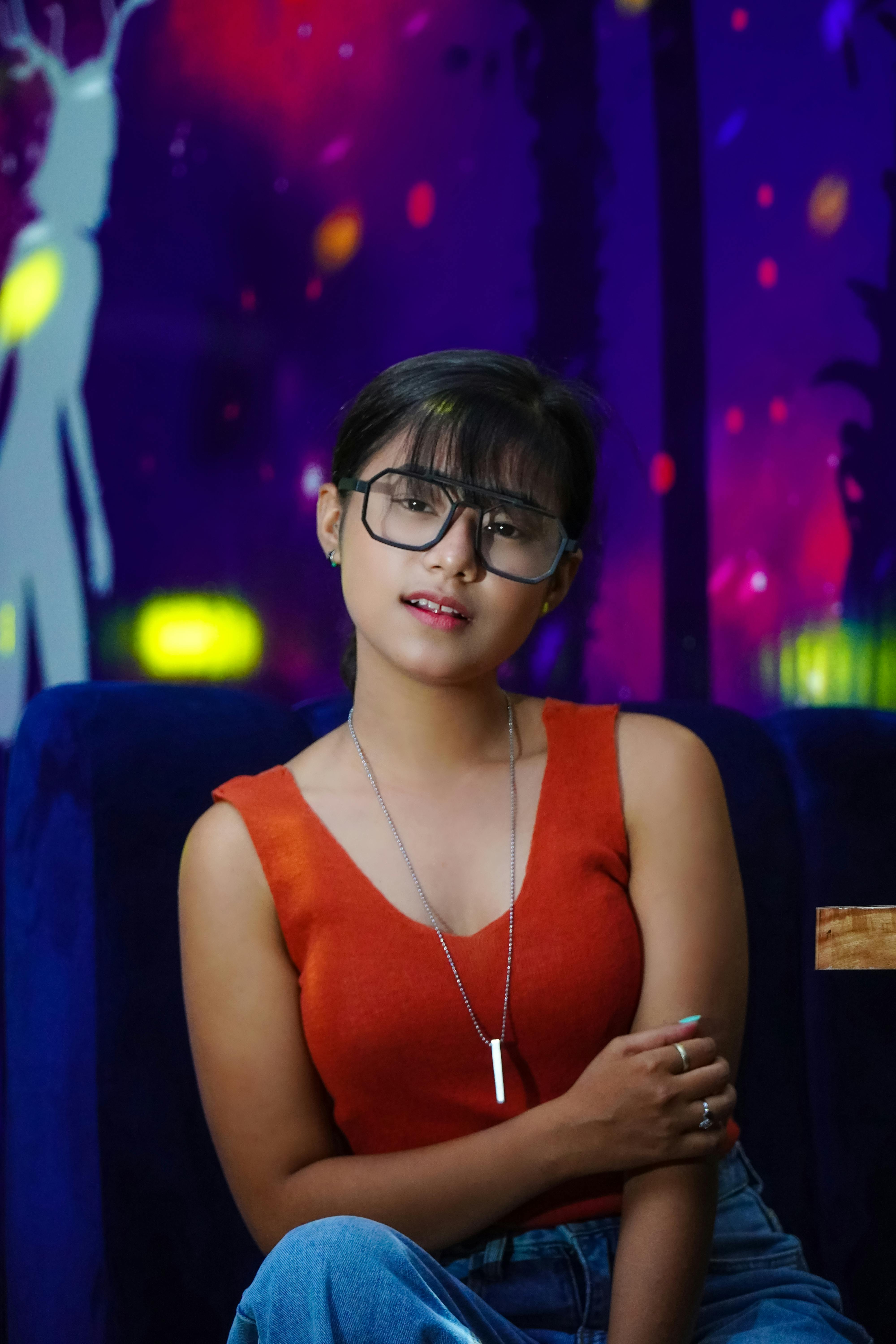 Stylish Portrait of a Woman in a Club Setting · Free Stock Photo