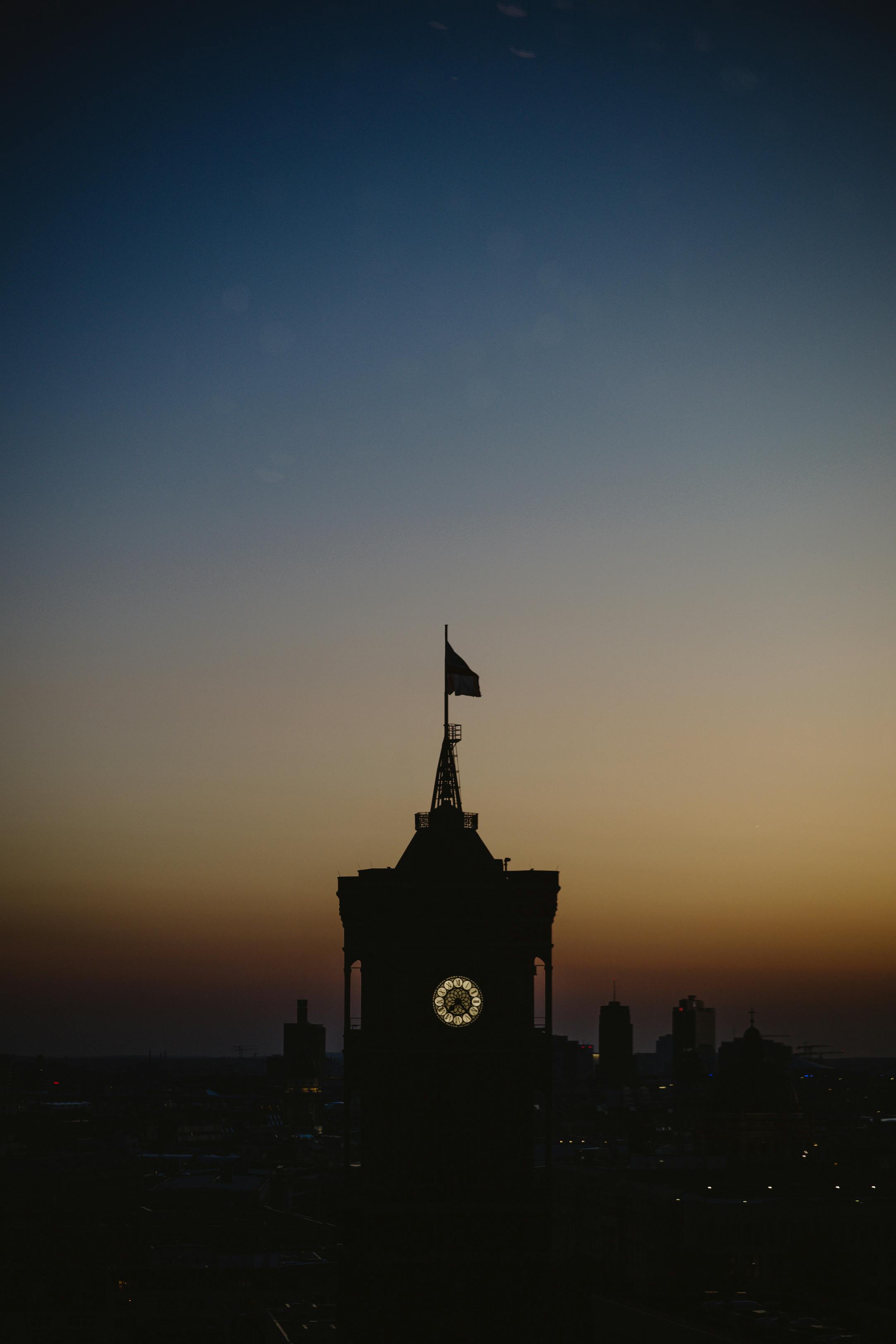 Berlin Clock Tower Silhouette at Sunset · Free Stock Photo