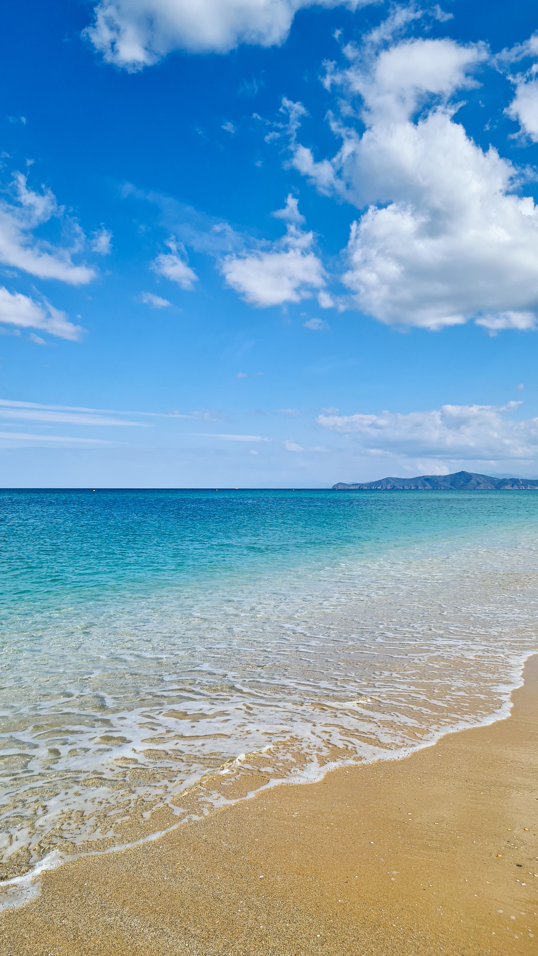 Serene Beach in Morocco with Clear Blue Skies · Free Stock Photo