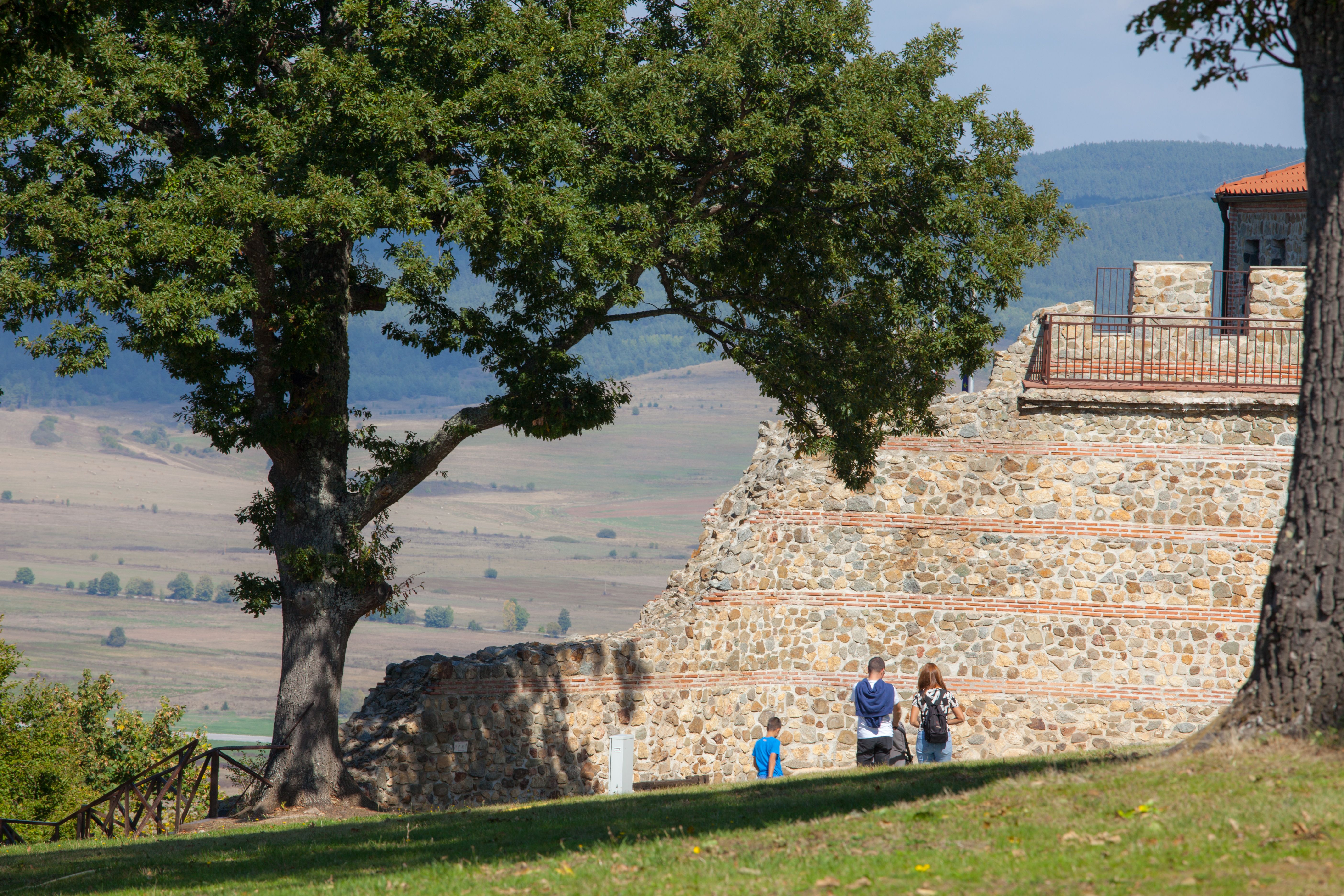 Exploring Ancient Ruins in a Scenic Landscape · Free Stock Photo