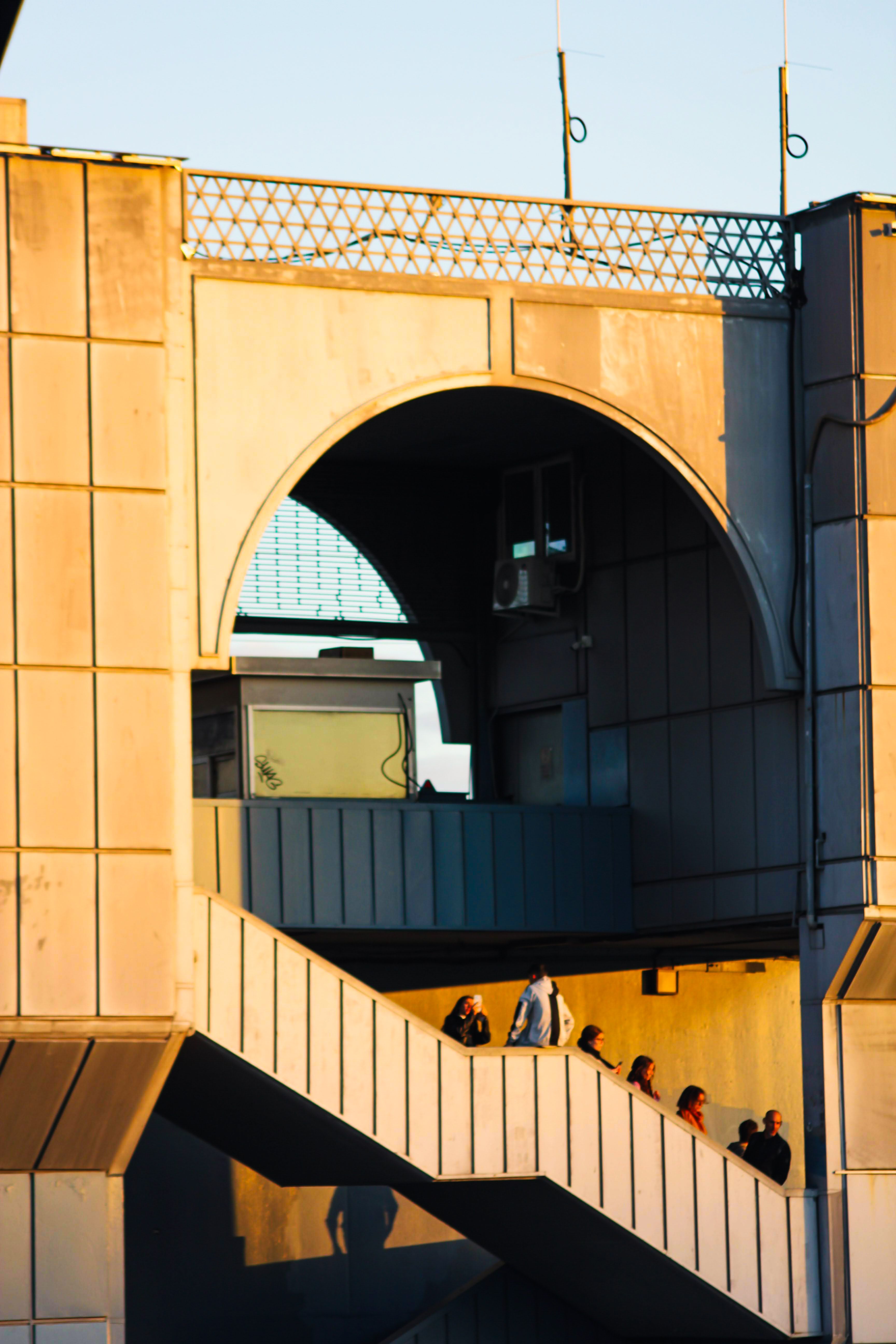 Architectural Structure with People Ascending Stairs · Free Stock Photo