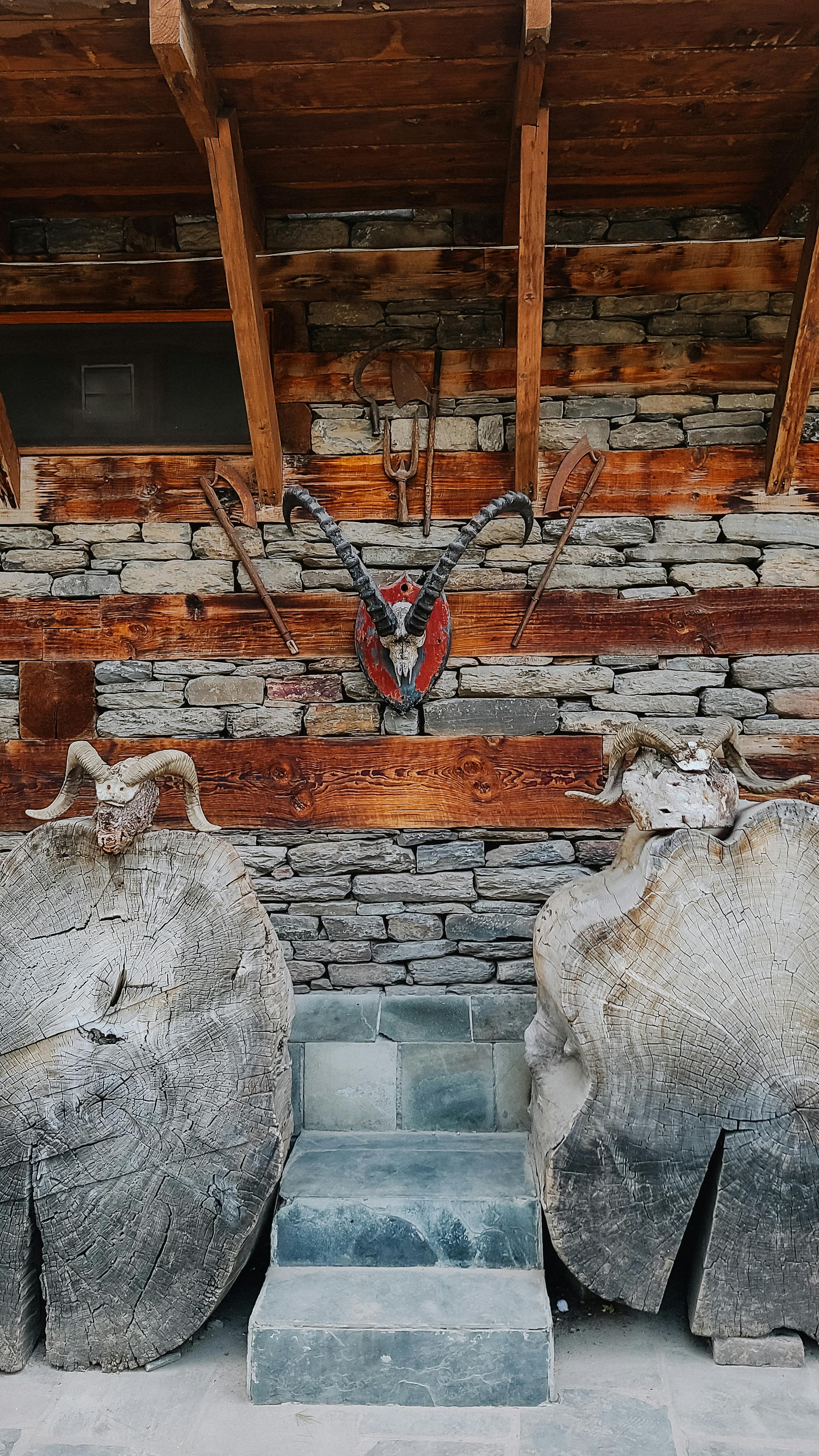 Rustic Stone and Wood Interior with Antler Decor · Free Stock Photo