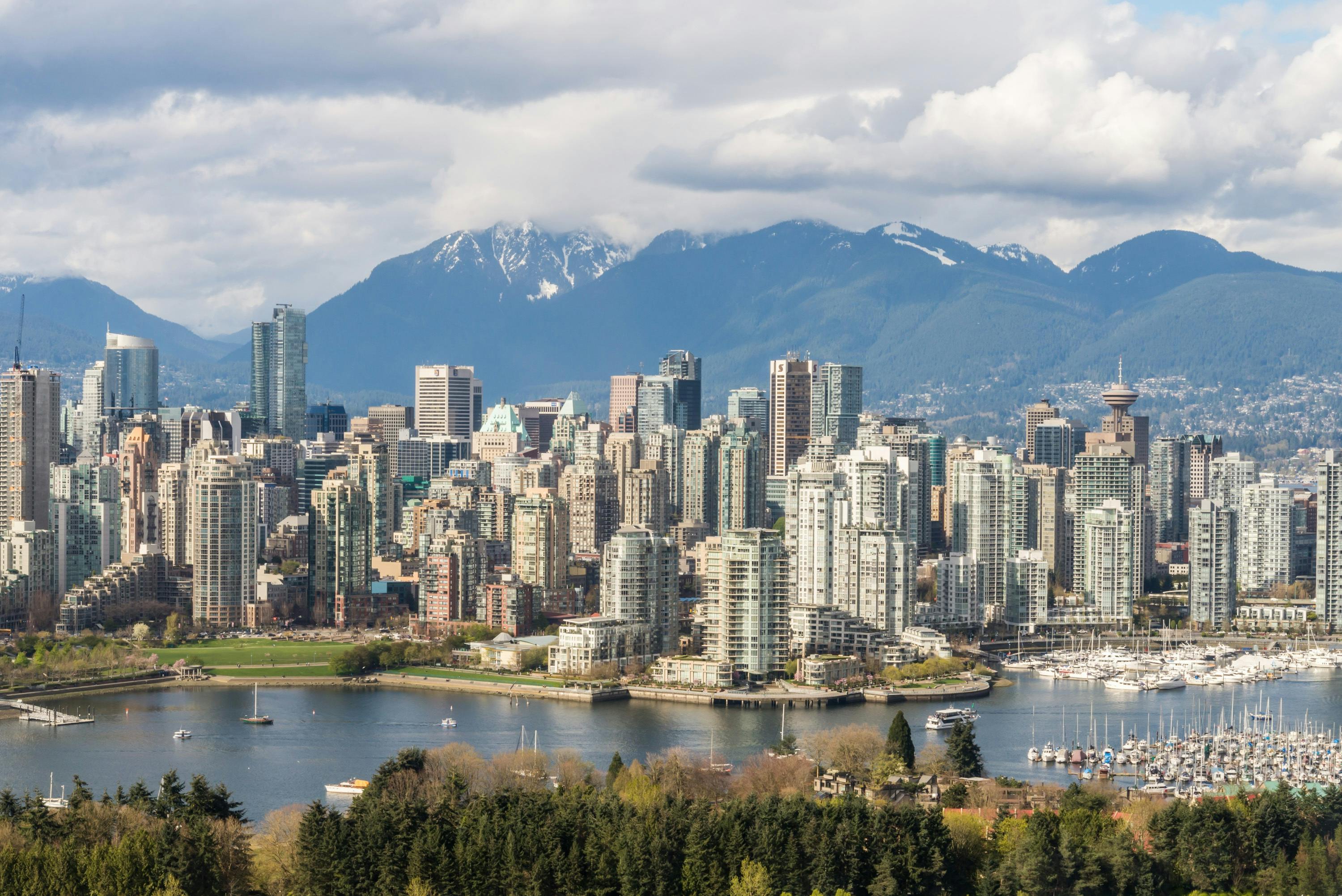 Vancouver Skyline with Mountains and Marina · Free Stock Photo