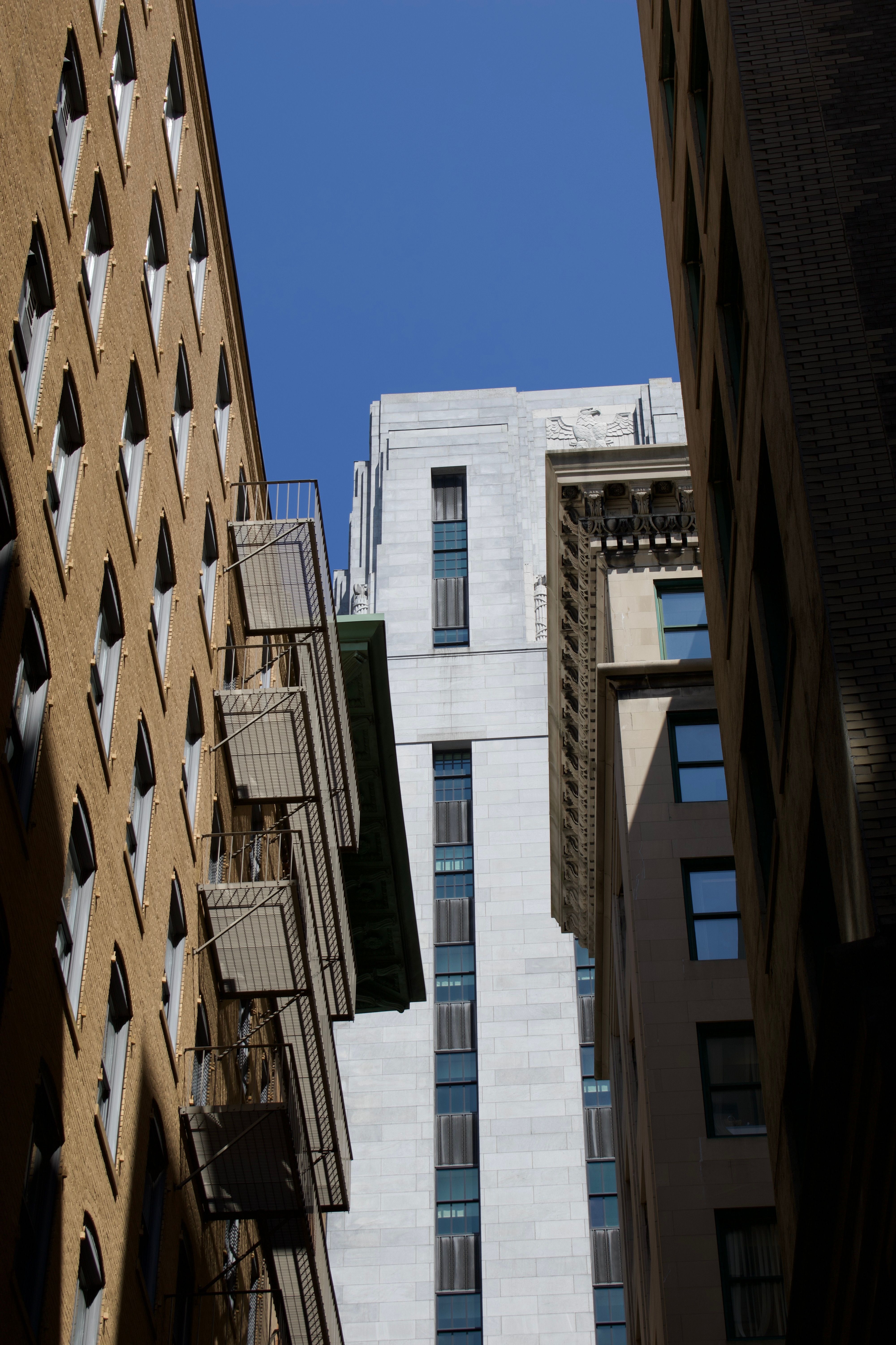 Dramatic Urban Architecture with Fire Escapes · Free Stock Photo