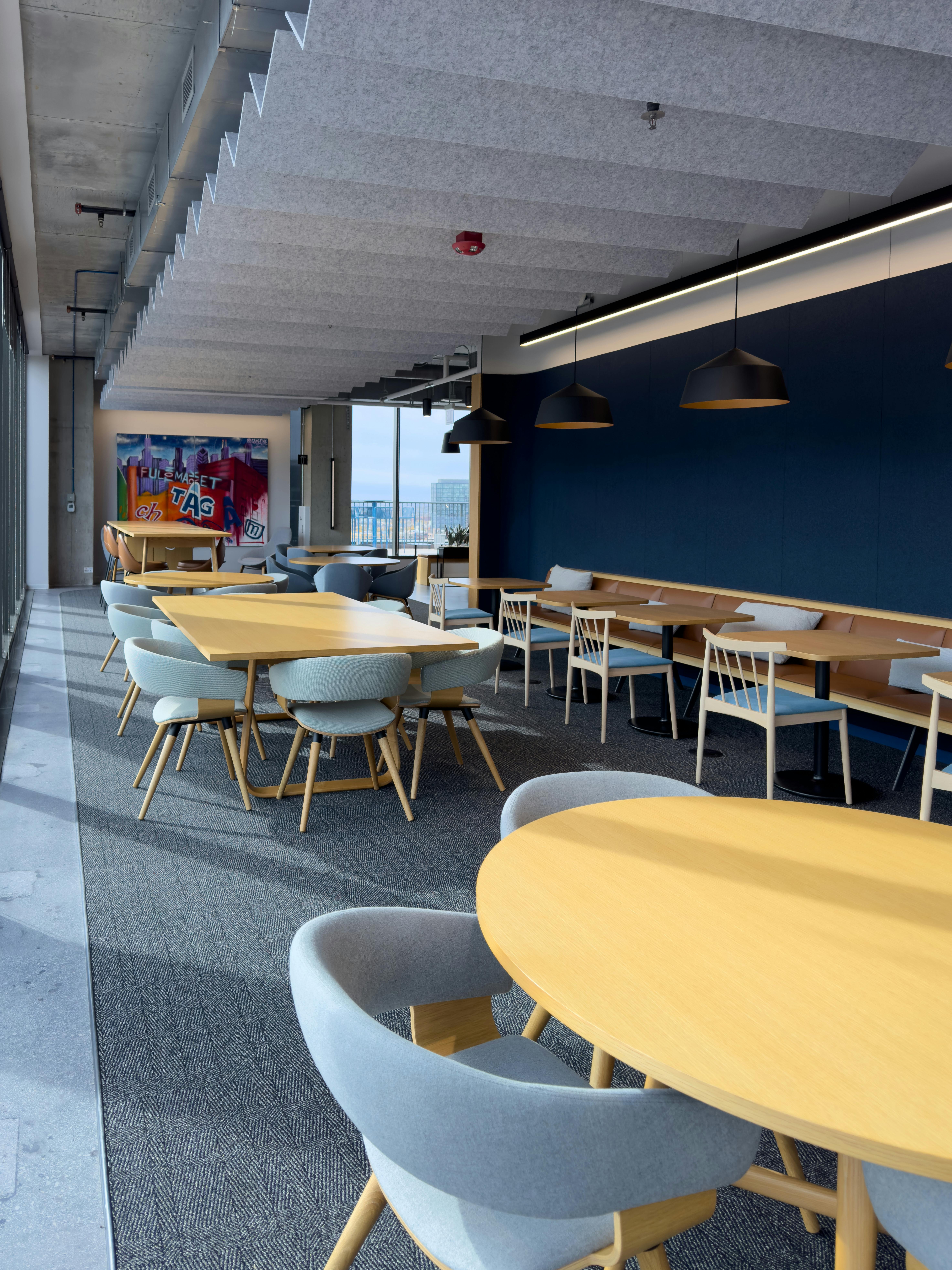 Modern Office Break Room with Stylish Seating · Free Stock Photo