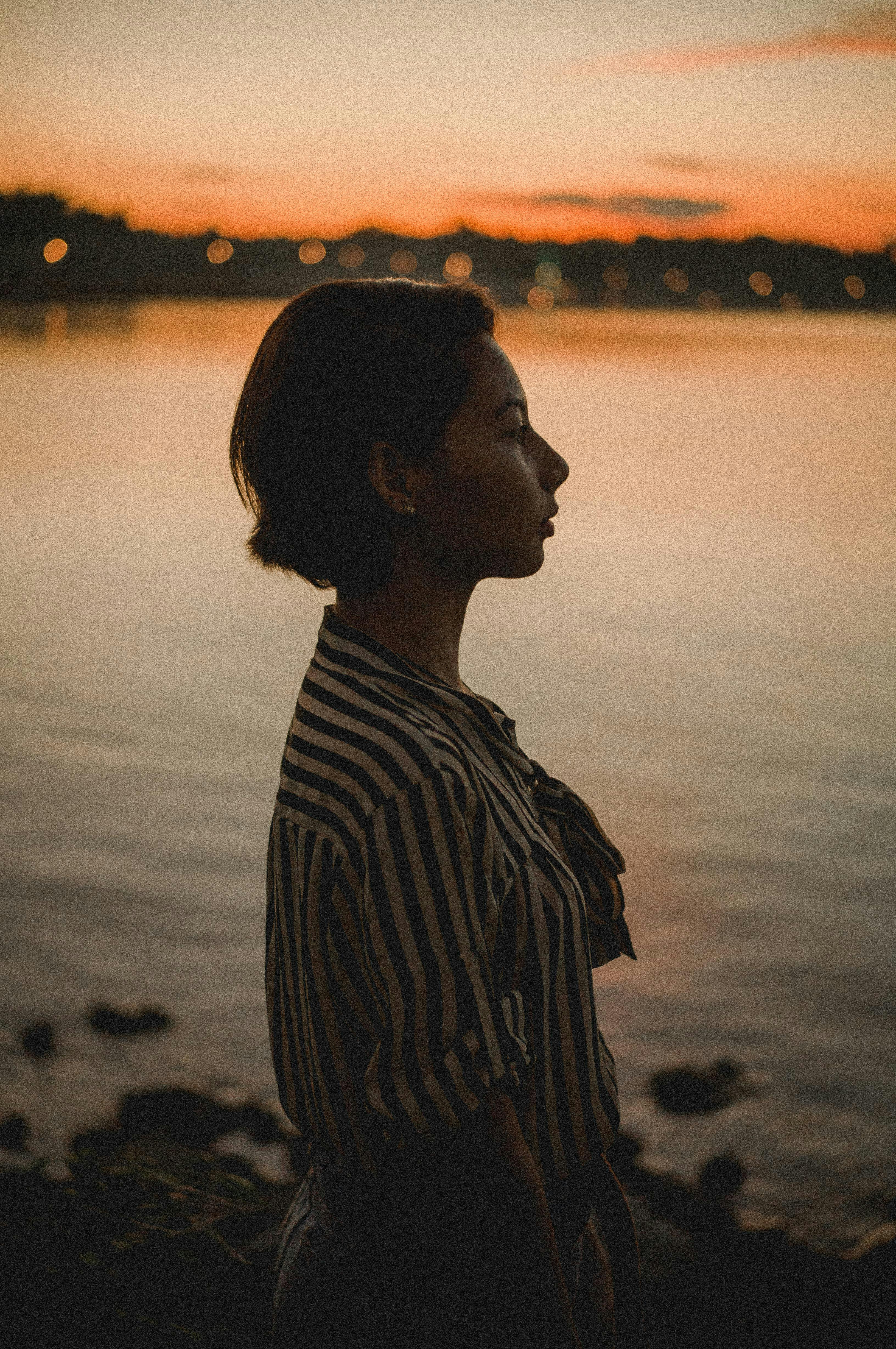 Side View Photo Of Woman During Dawn · Free Stock Photo