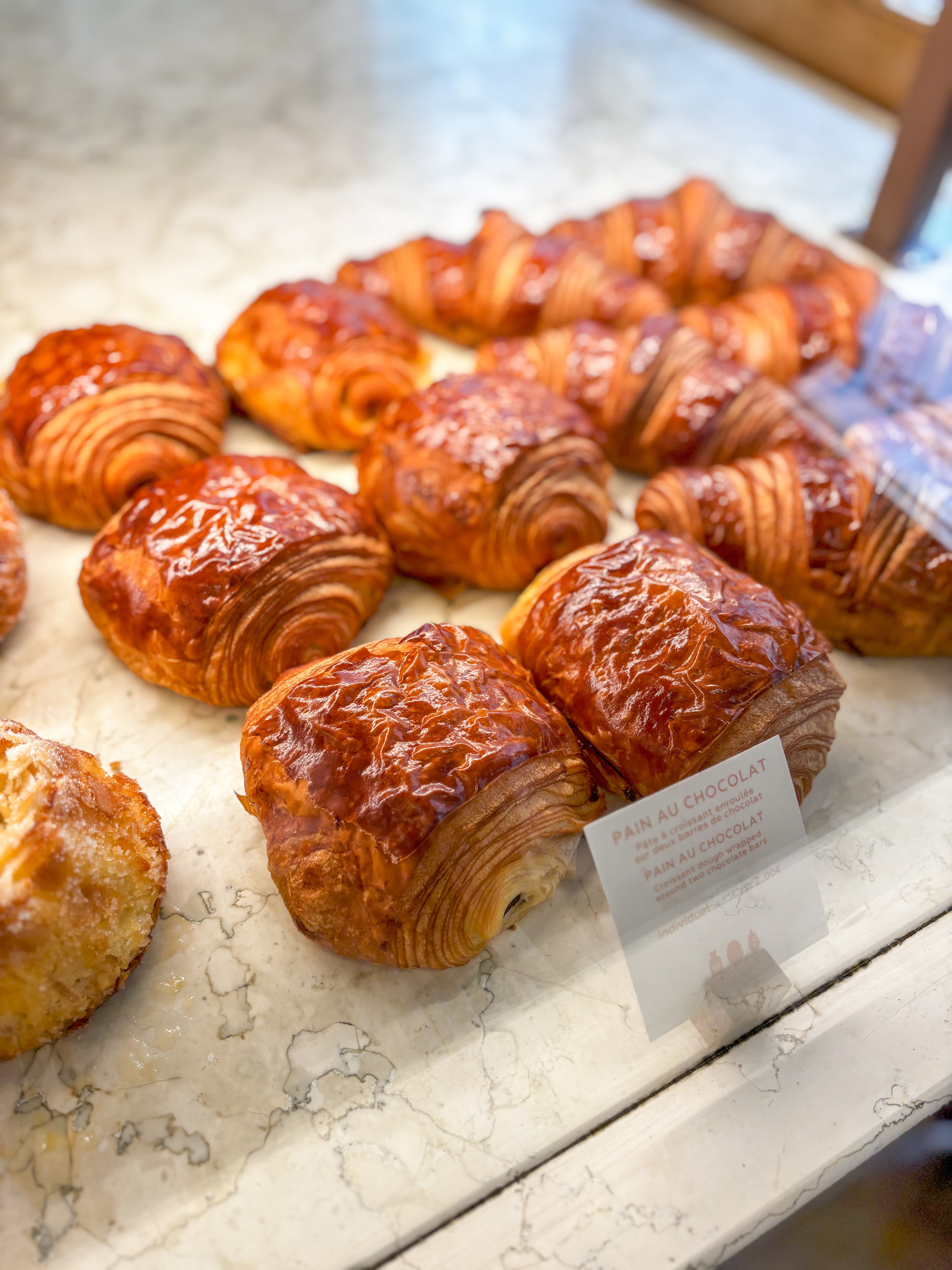Delicious French Pastries Display in Paris · Free Stock Photo