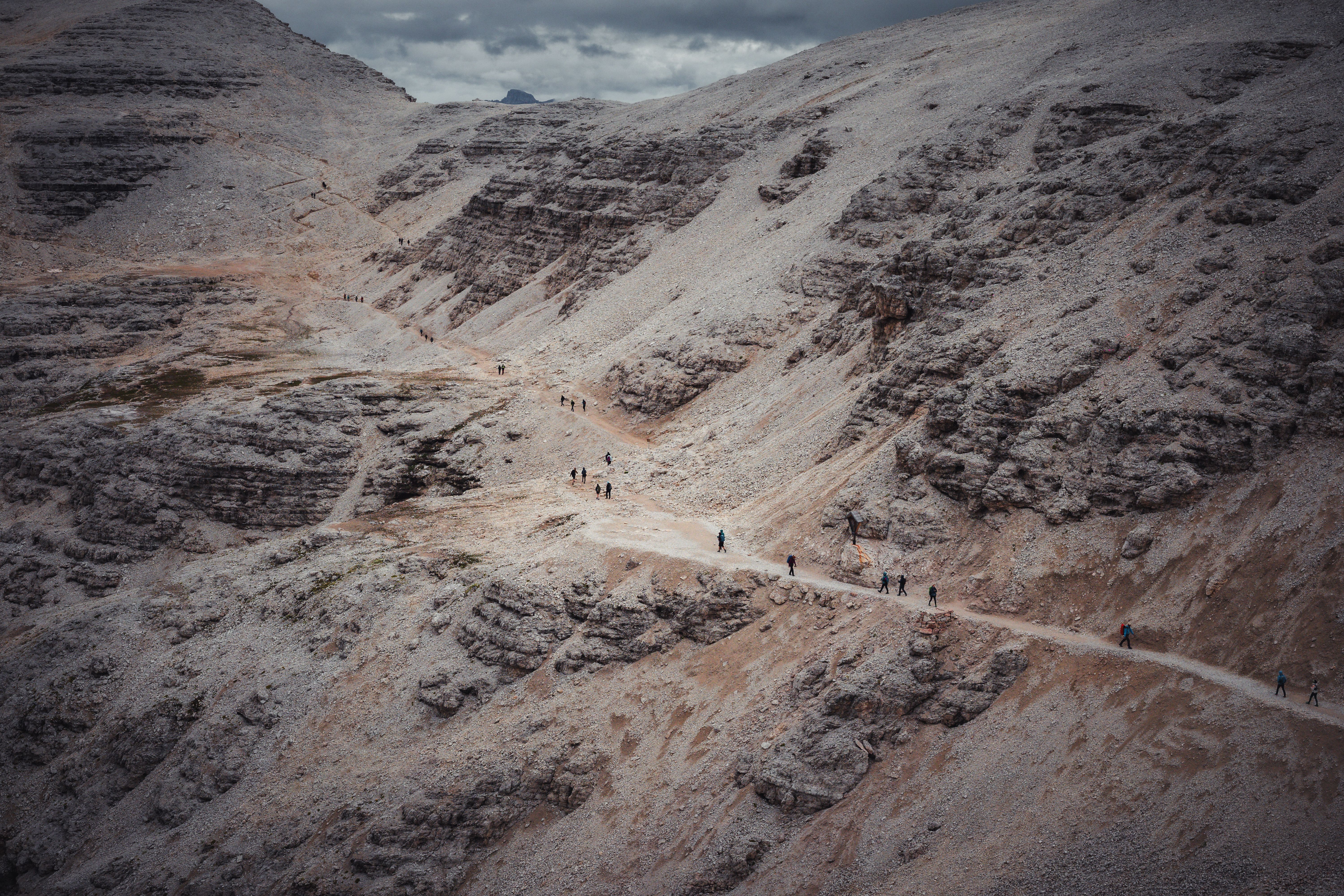 Scenic Mountain Trail with Hikers in Rocky Terrain · Free Stock Photo