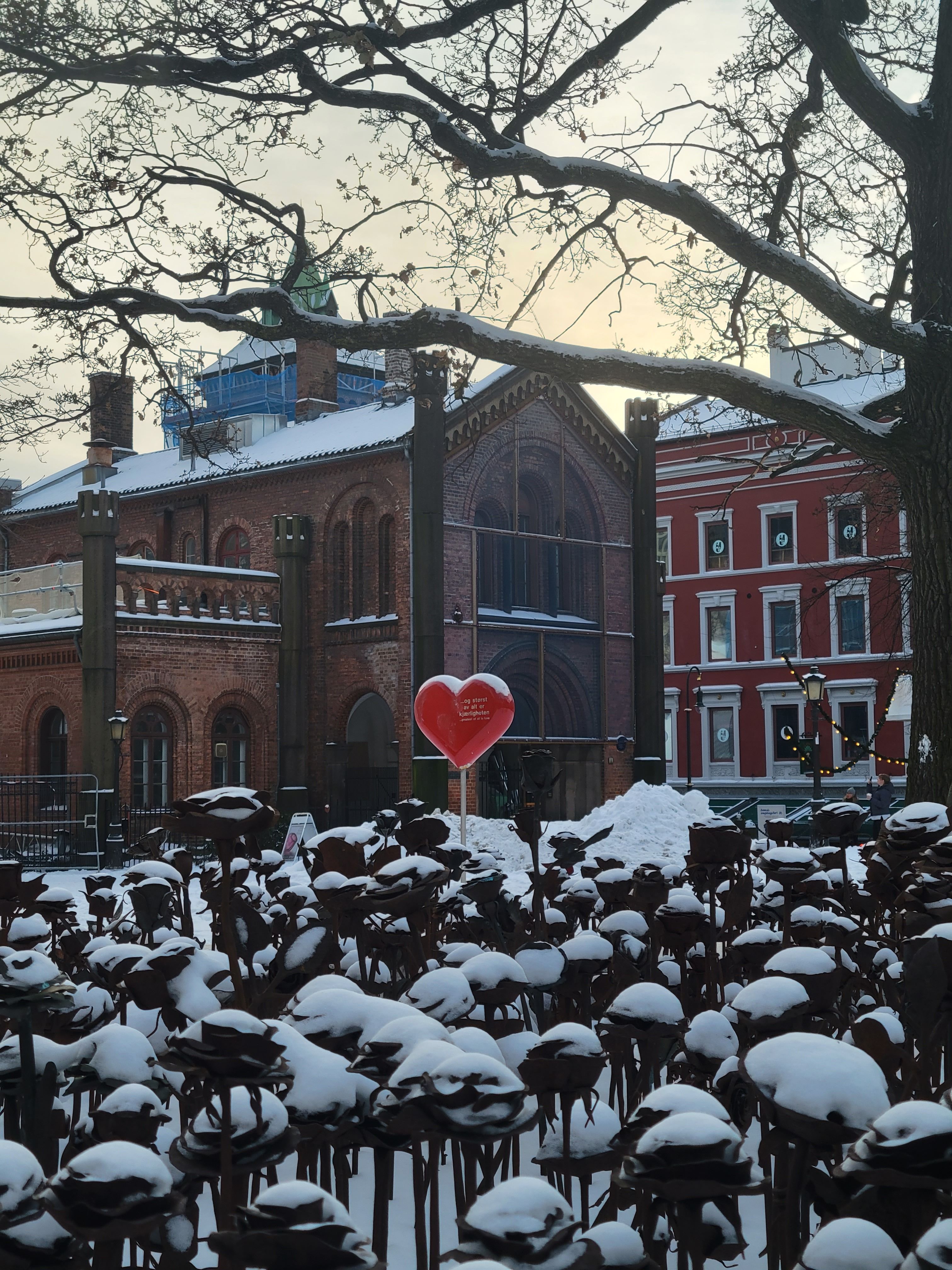 Snowy Scene Outside Historic Oslo Building · Free Stock Photo
