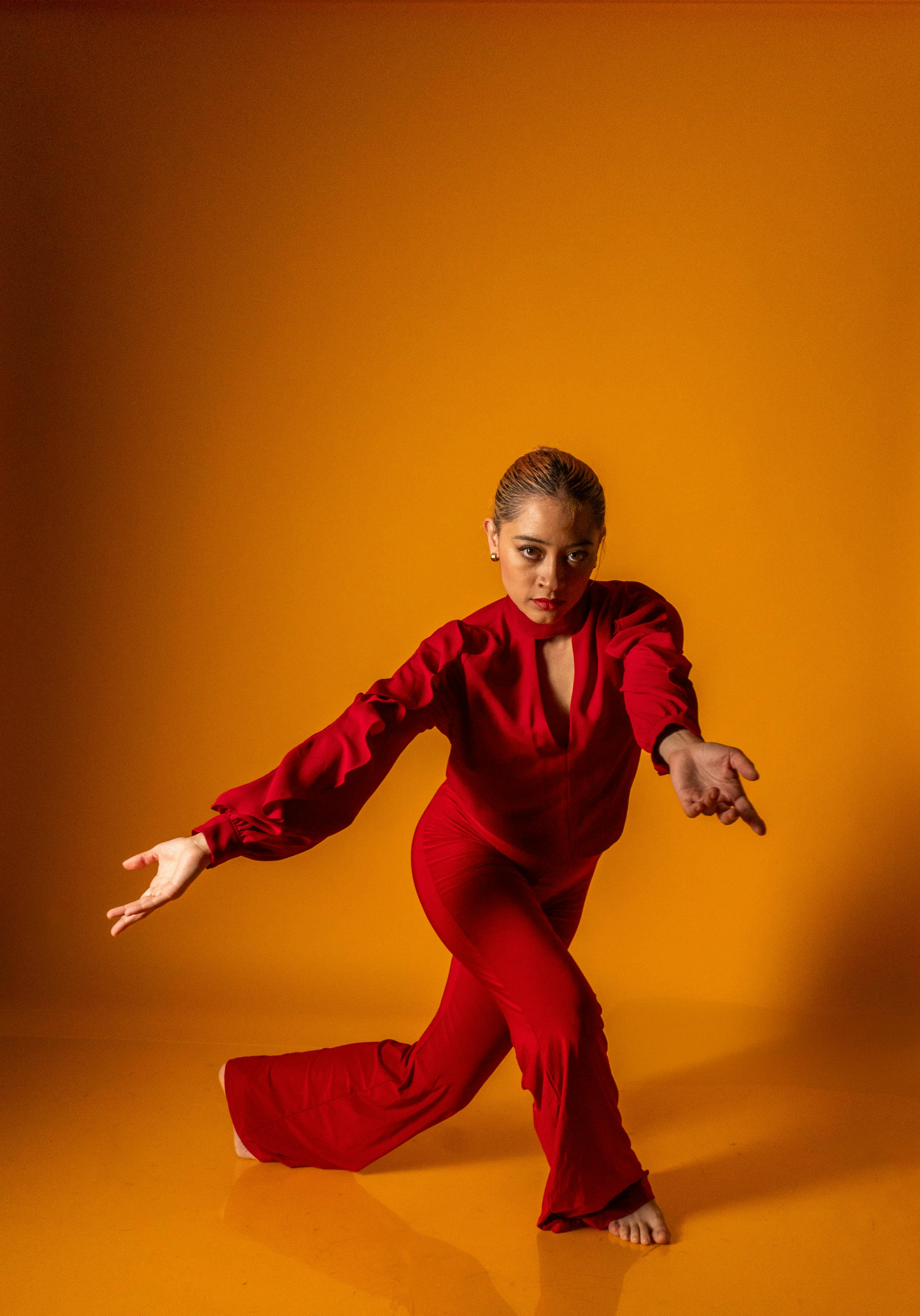 Elegant Contemporary Dancer in Red Pose · Free Stock Photo