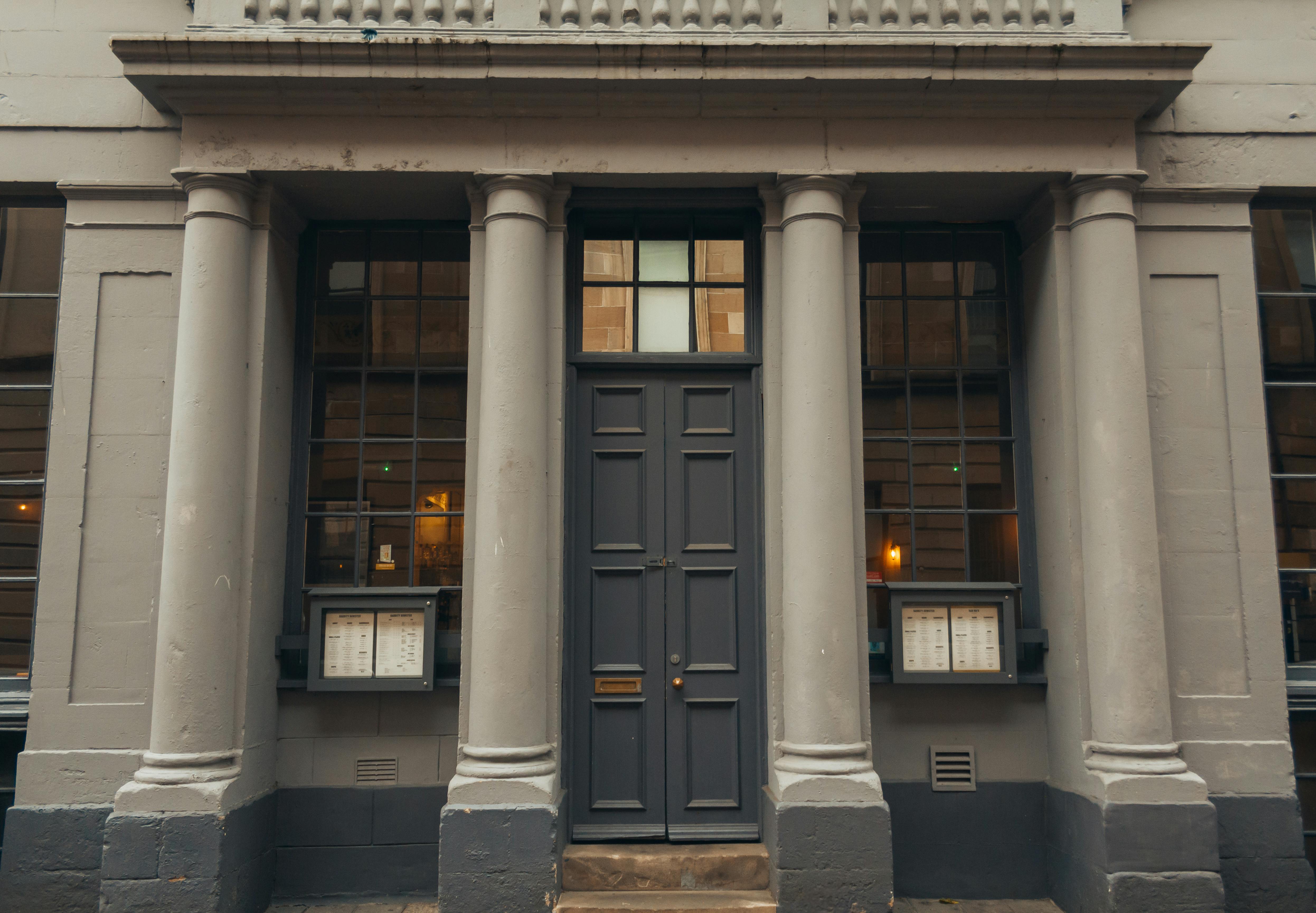 Classic Architectural Facade with Columns · Free Stock Photo