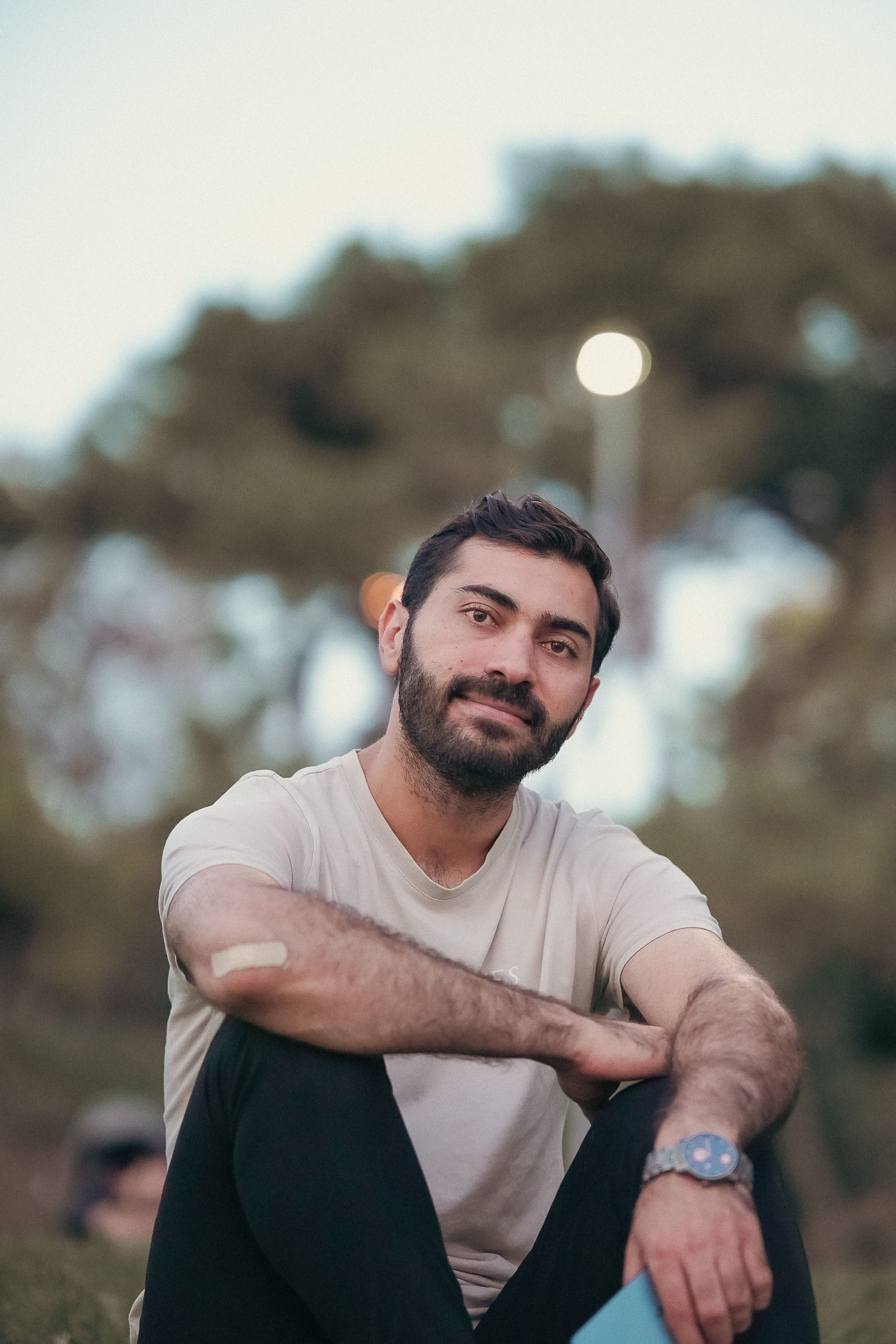 Casual Portrait of a Man in Istanbul Park · Free Stock Photo