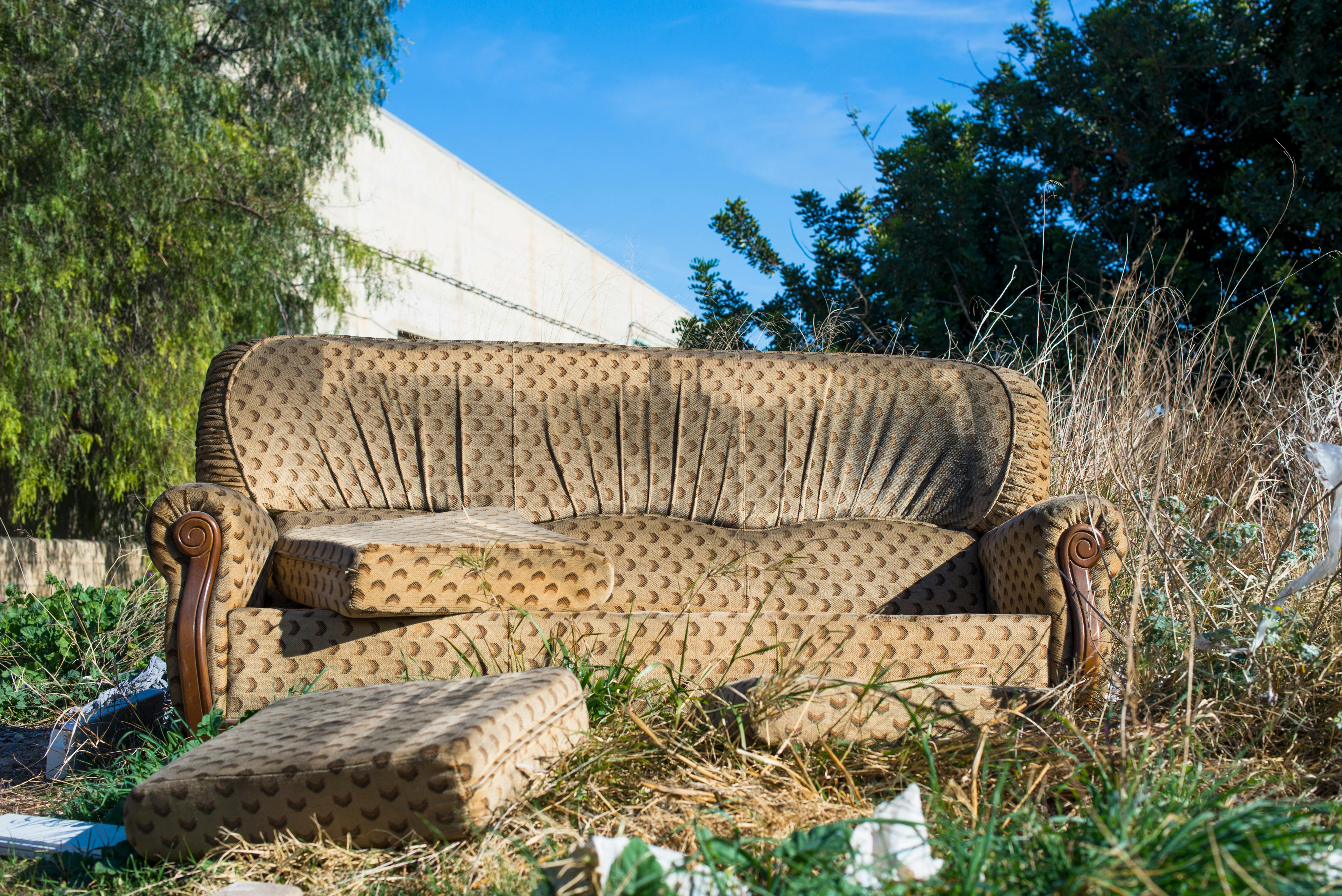 Abandoned Couch Outdoors Among Nature · Free Stock Photo